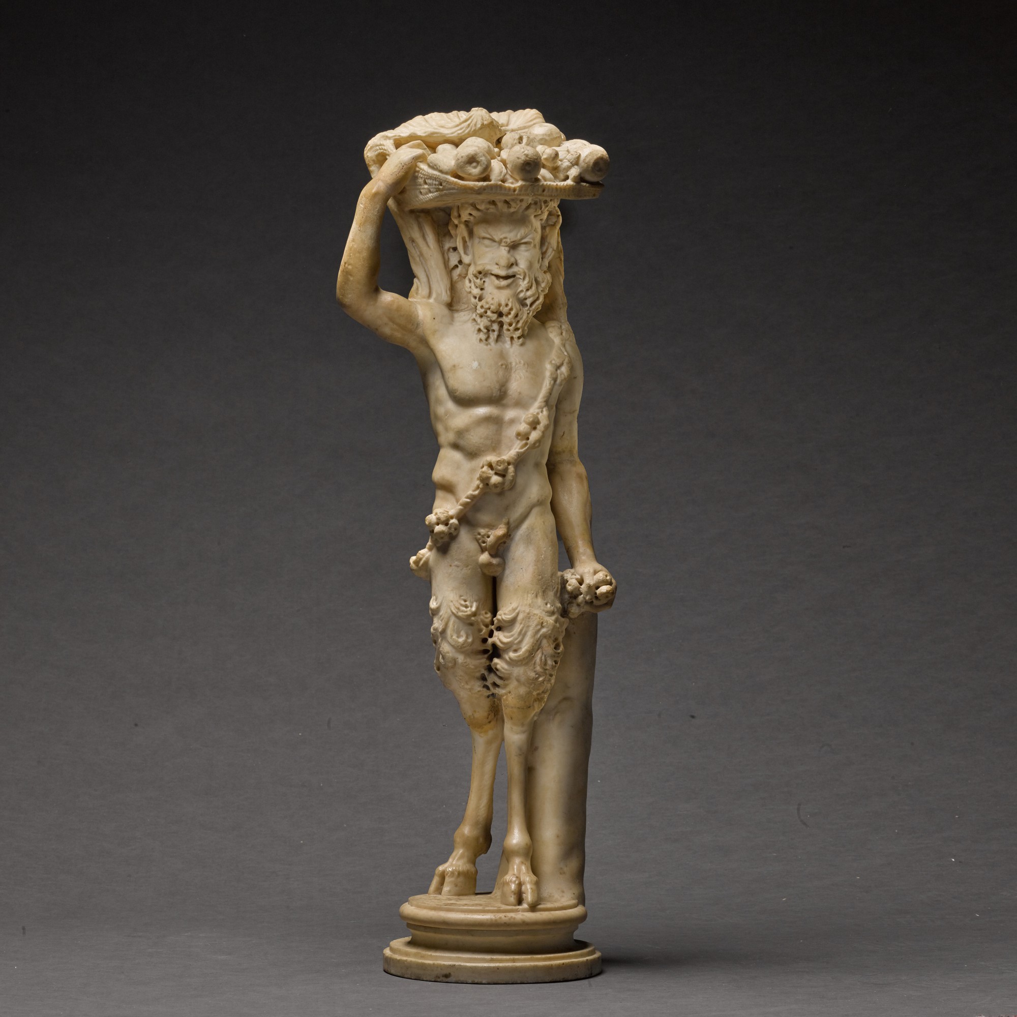 A ROMAN MARBLE FIGURE OF PAN, CIRCA 2ND CENTURY A.D., WITH CIRCA 18TH ...