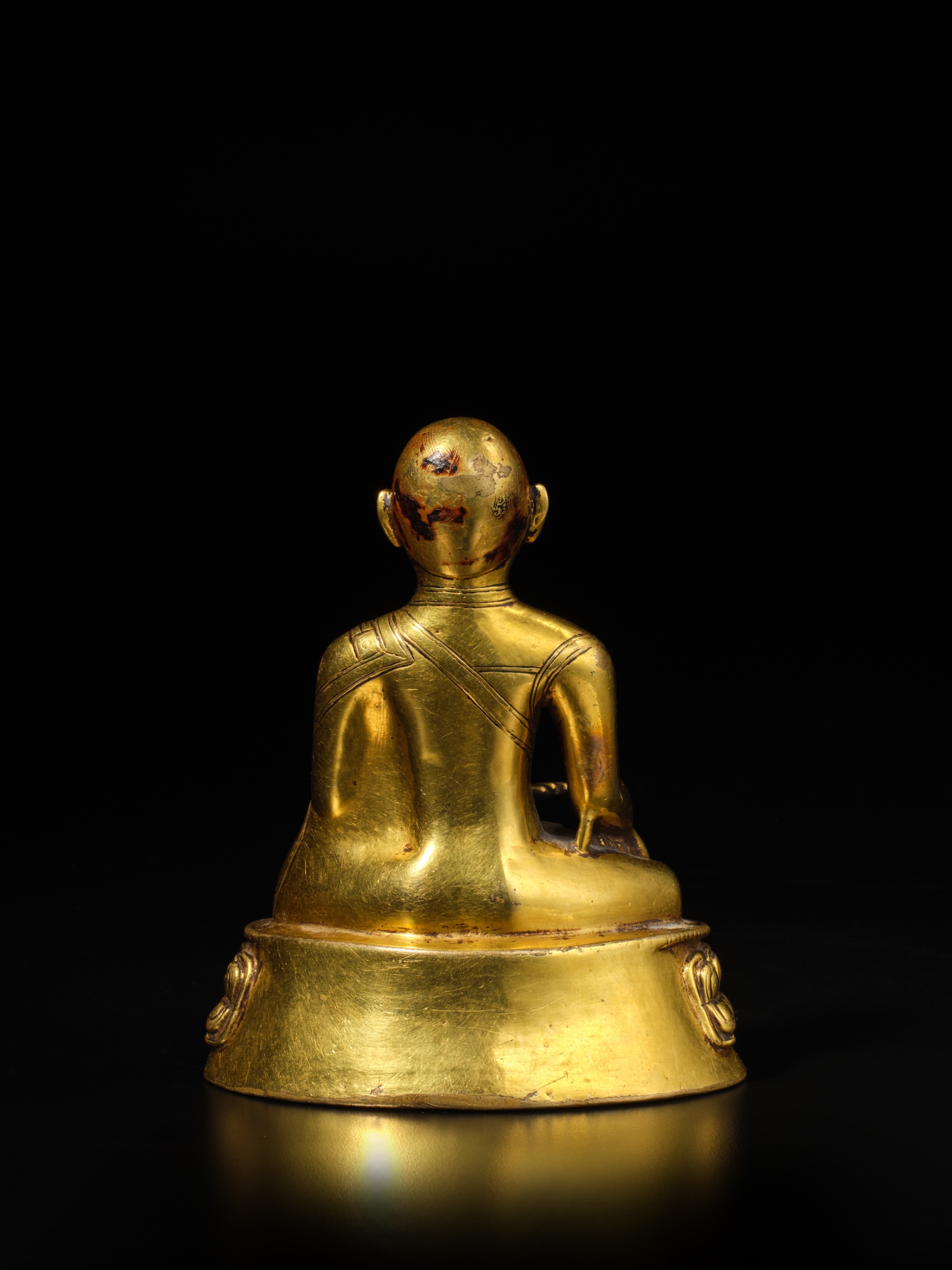 A gilt-copper alloy figure of Jigten Sumgon Rinchen Pel, Tibet, 13th ...