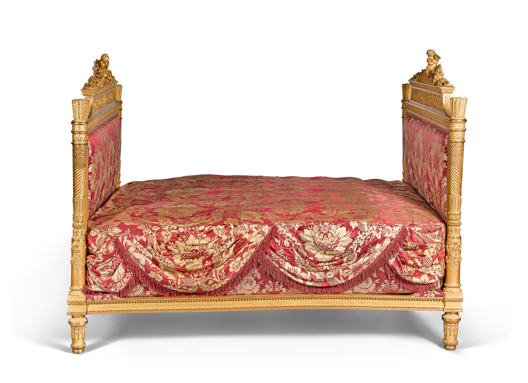 A LOUIS XVI CARVED GILTWOOD LIT À LA ROMAINE, ATTRIBUTED TO GEORGES ...