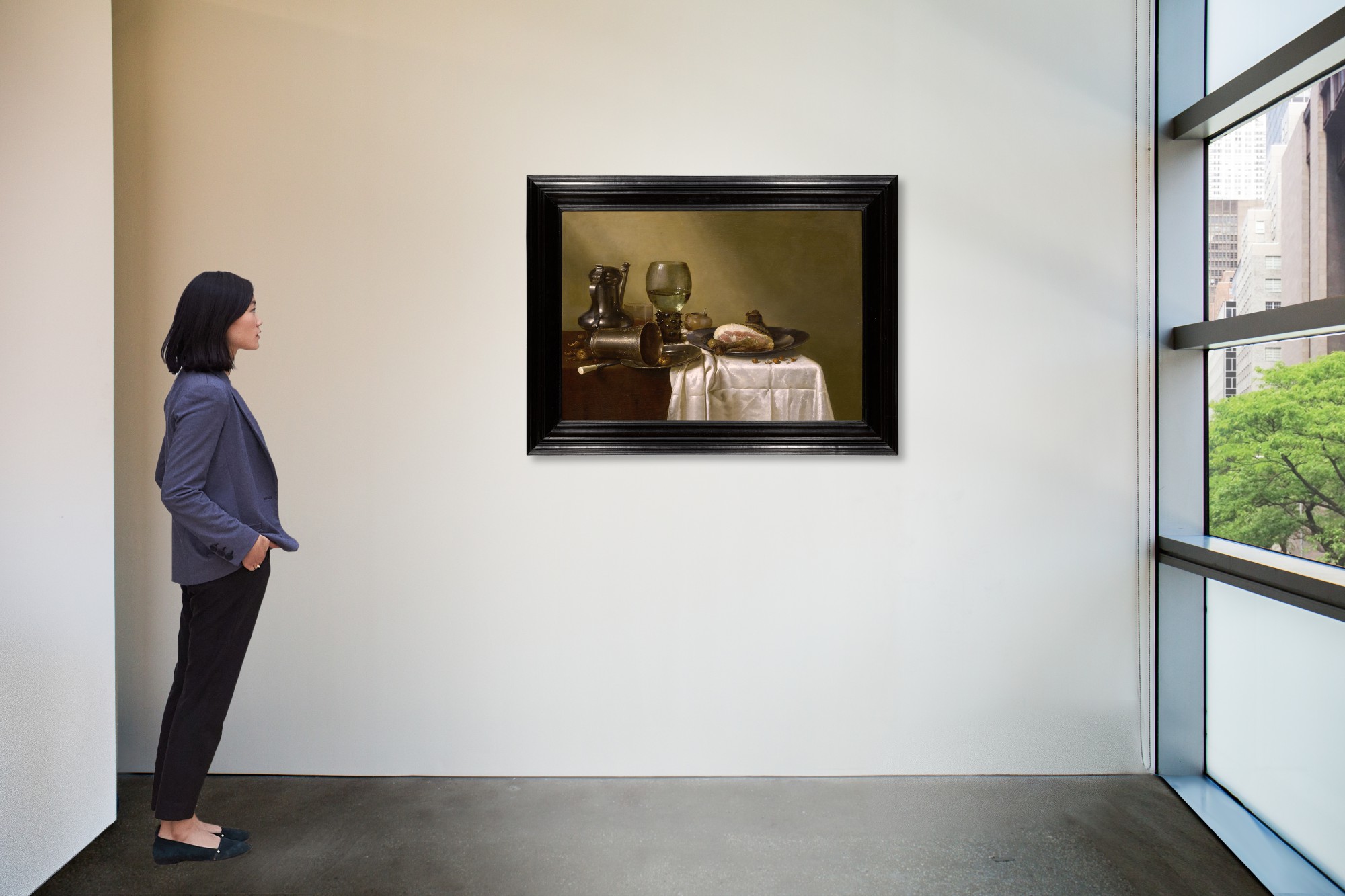 Still life of a pewter kanne, a roemer, an overturned silver beaker ...