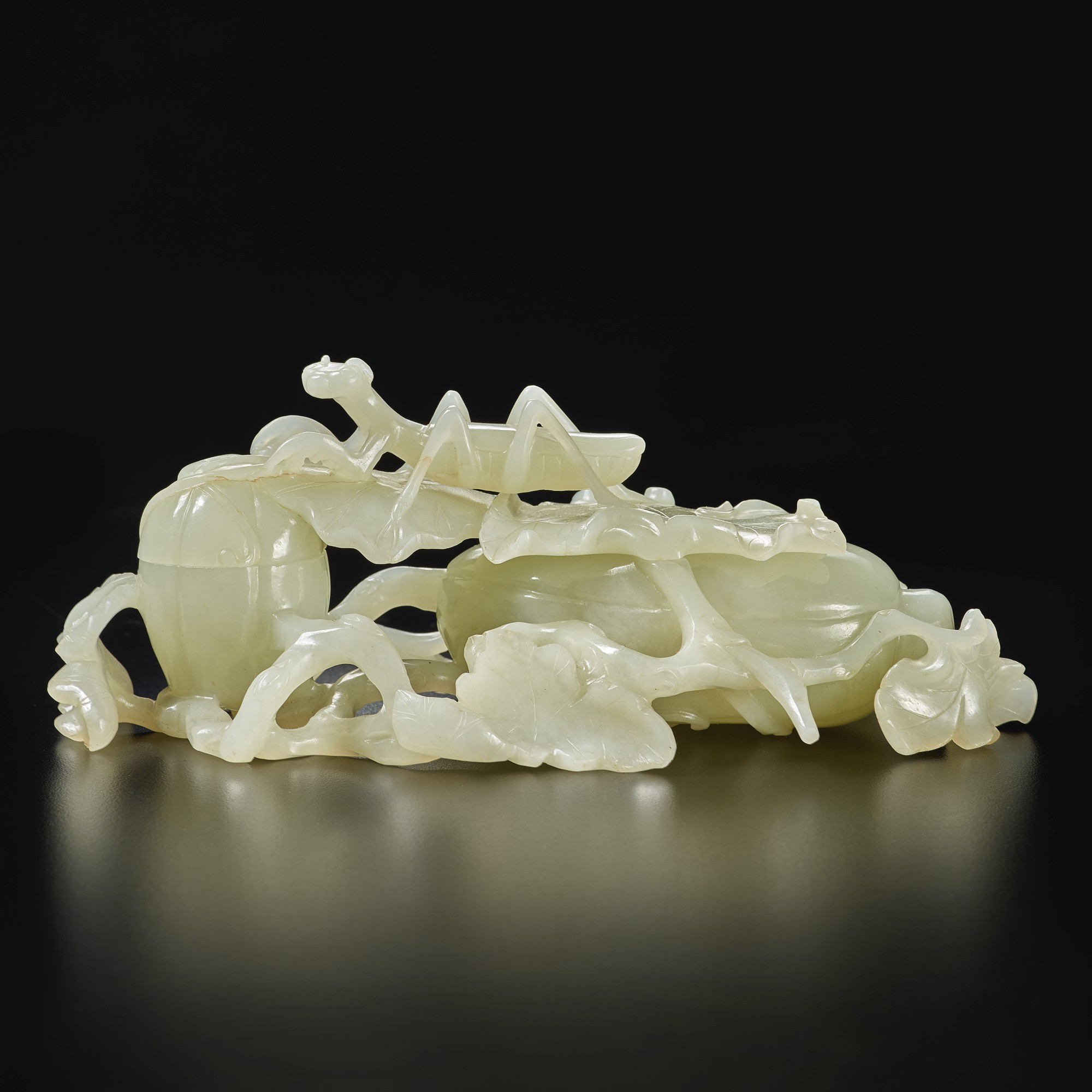A pale green jade 'praying mantis' double box and cover, Qing dynasty ...