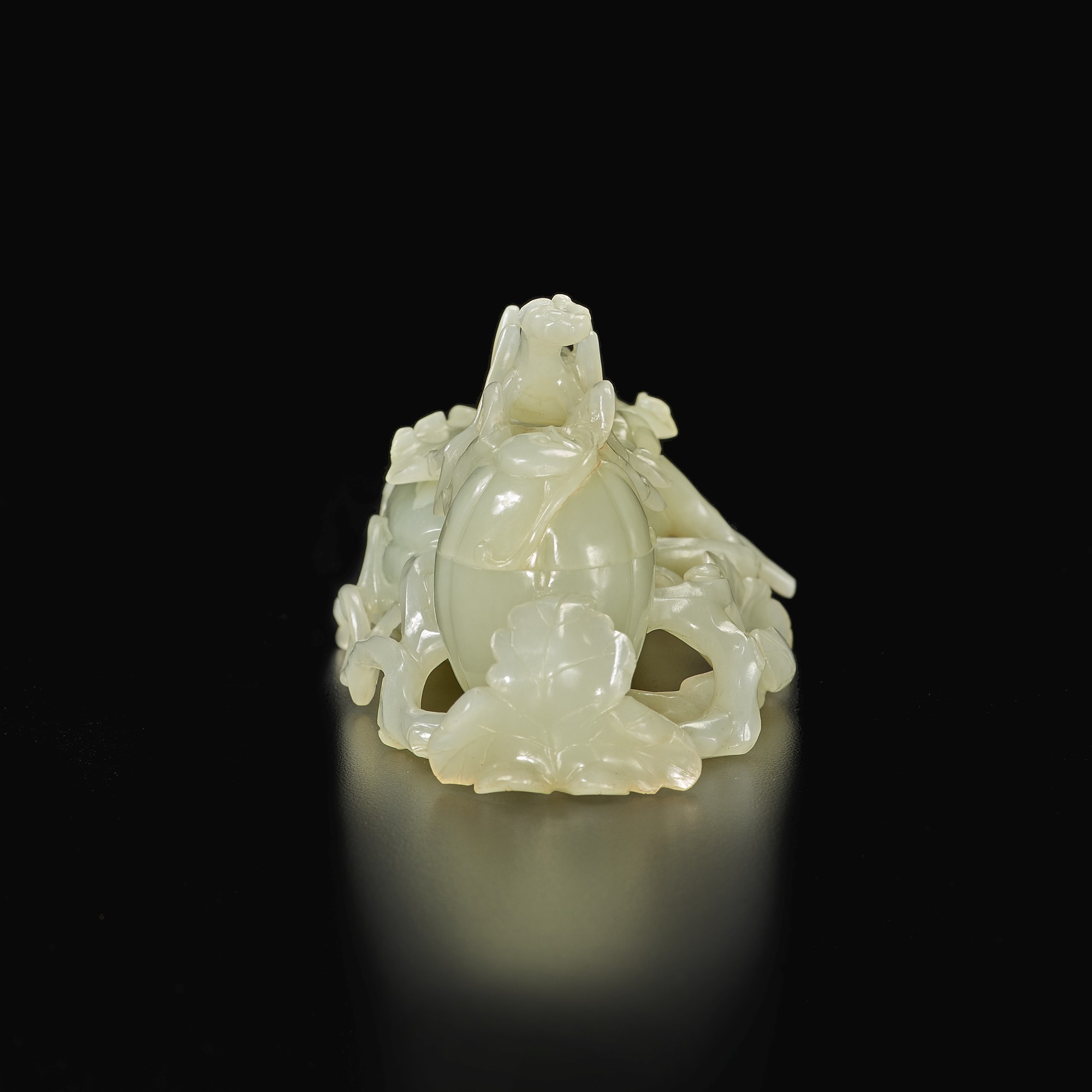 A pale green jade 'praying mantis' double box and cover, Qing dynasty ...