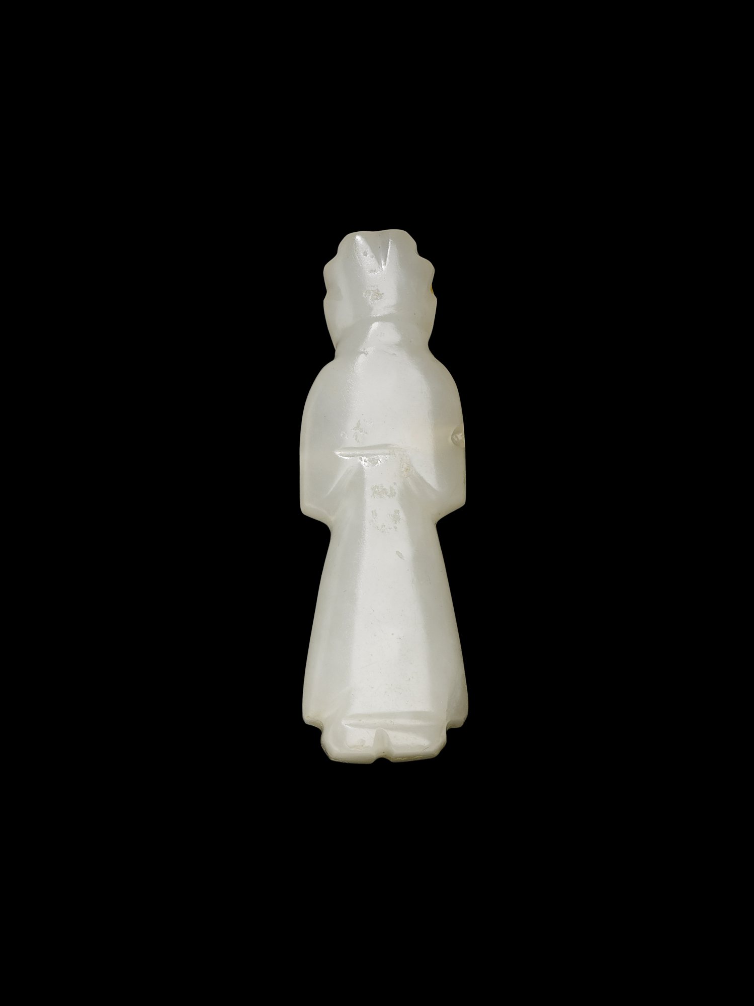 A white jade miniature figure of a standing man, Wengzhong, Han dynasty ...