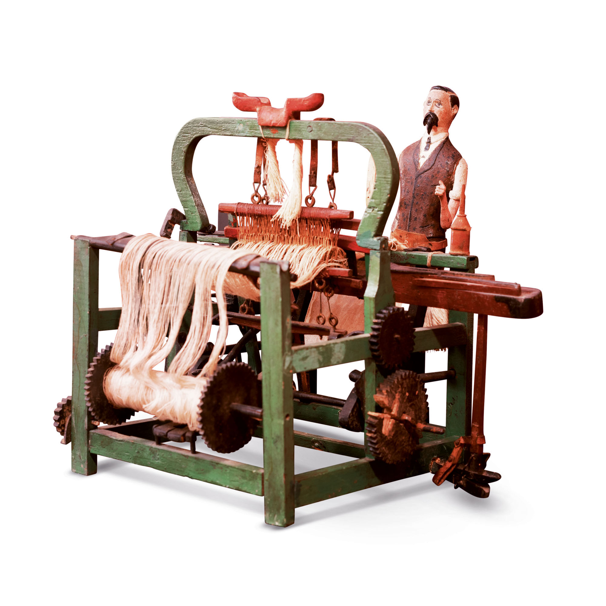 FINE AND RARE CARVED AND PAINT-DECORATED SCULPTURE OF A MAN AT A LOOM ...