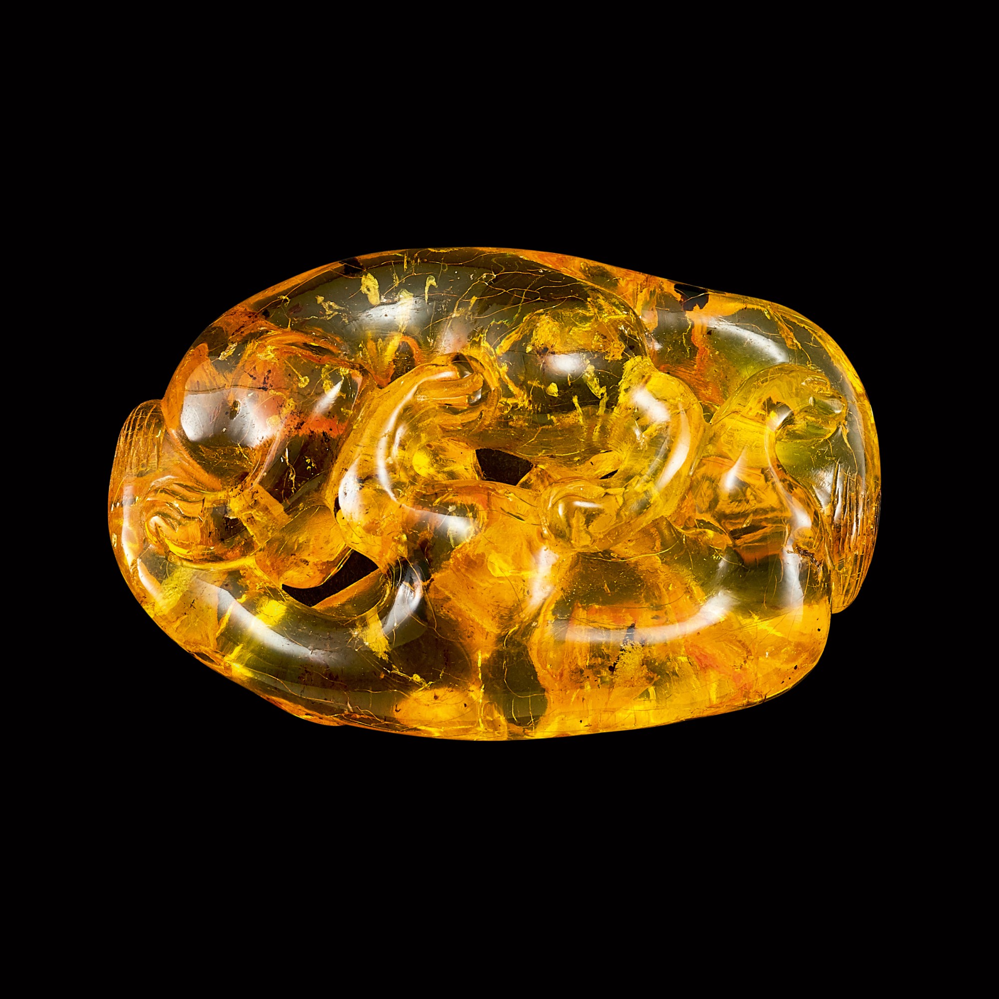An amber 'badgers' pendant Qing dynasty, 19th century | 清十九世紀 琥珀雙獾 | A ...