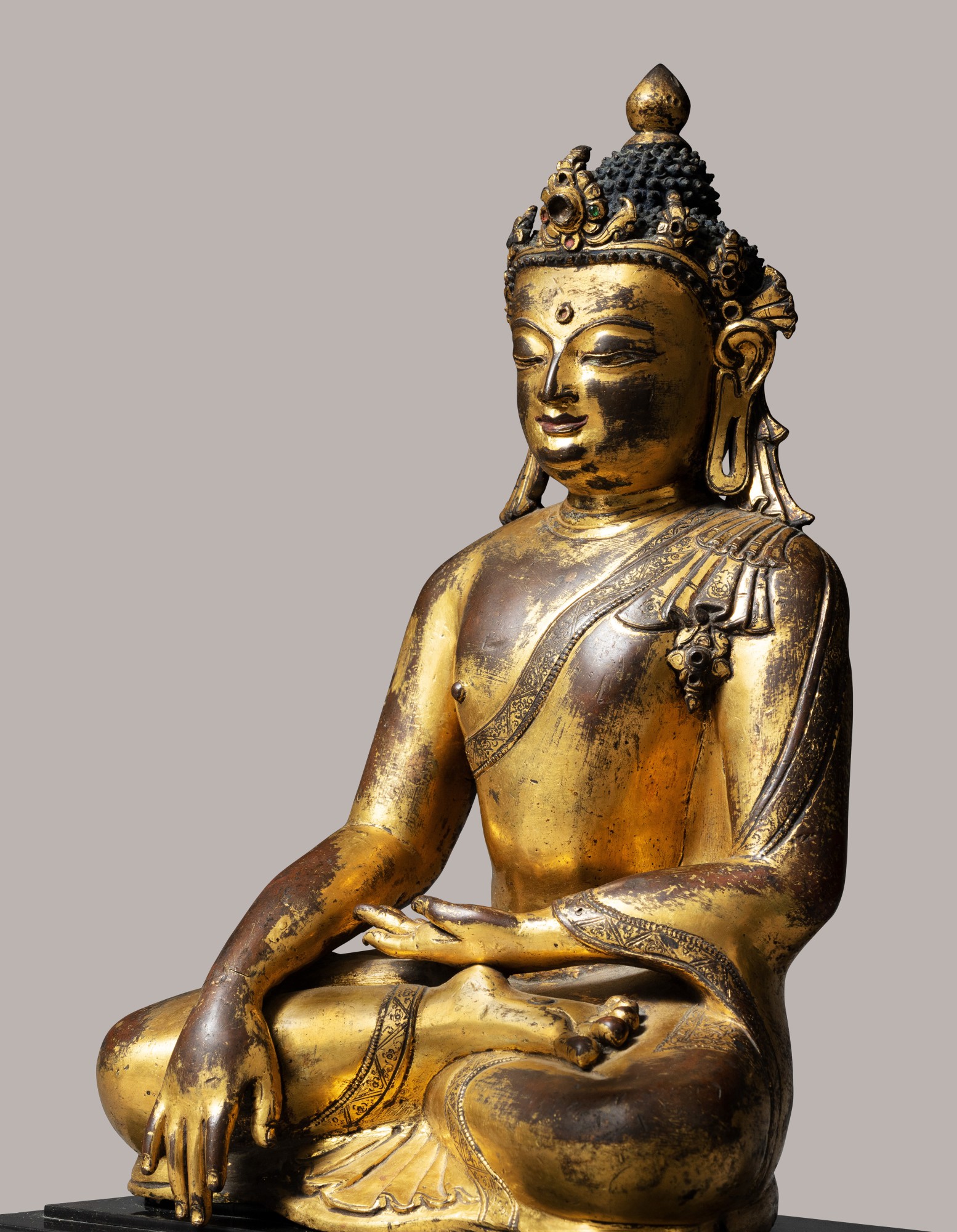 Gilt copper Buddha Shakyamuni with inset stones Nepal, Early Malla ...