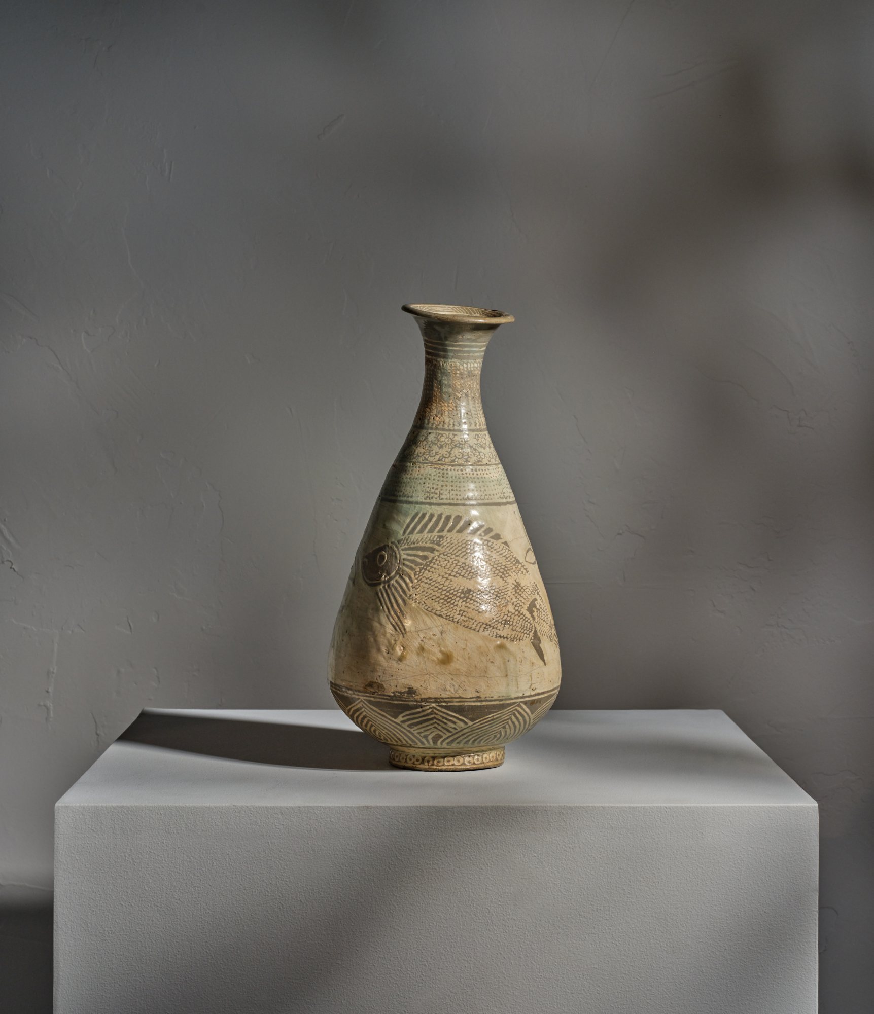 An incised and inlaid Buncheong 'fish' pear-shaped vase, Joseon dynasty ...