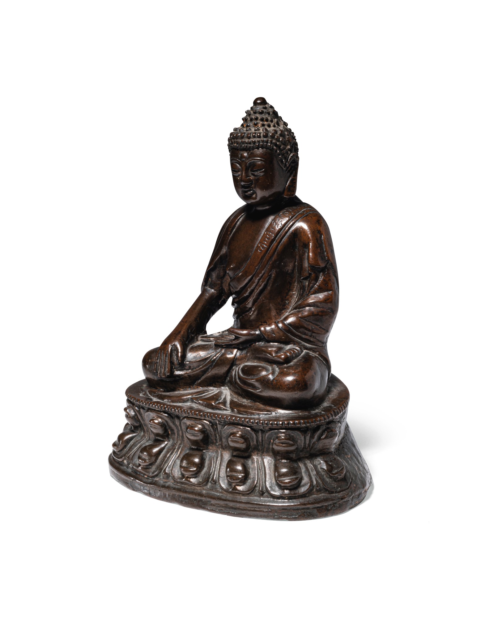 STATUETTE DE BOUDDHA SHAKYAMUNI EN BRONZE DYNASTIE MING, XVIE SIÈCLE | 明十六世紀 銅釋迦牟尼佛坐像 | A seated ...