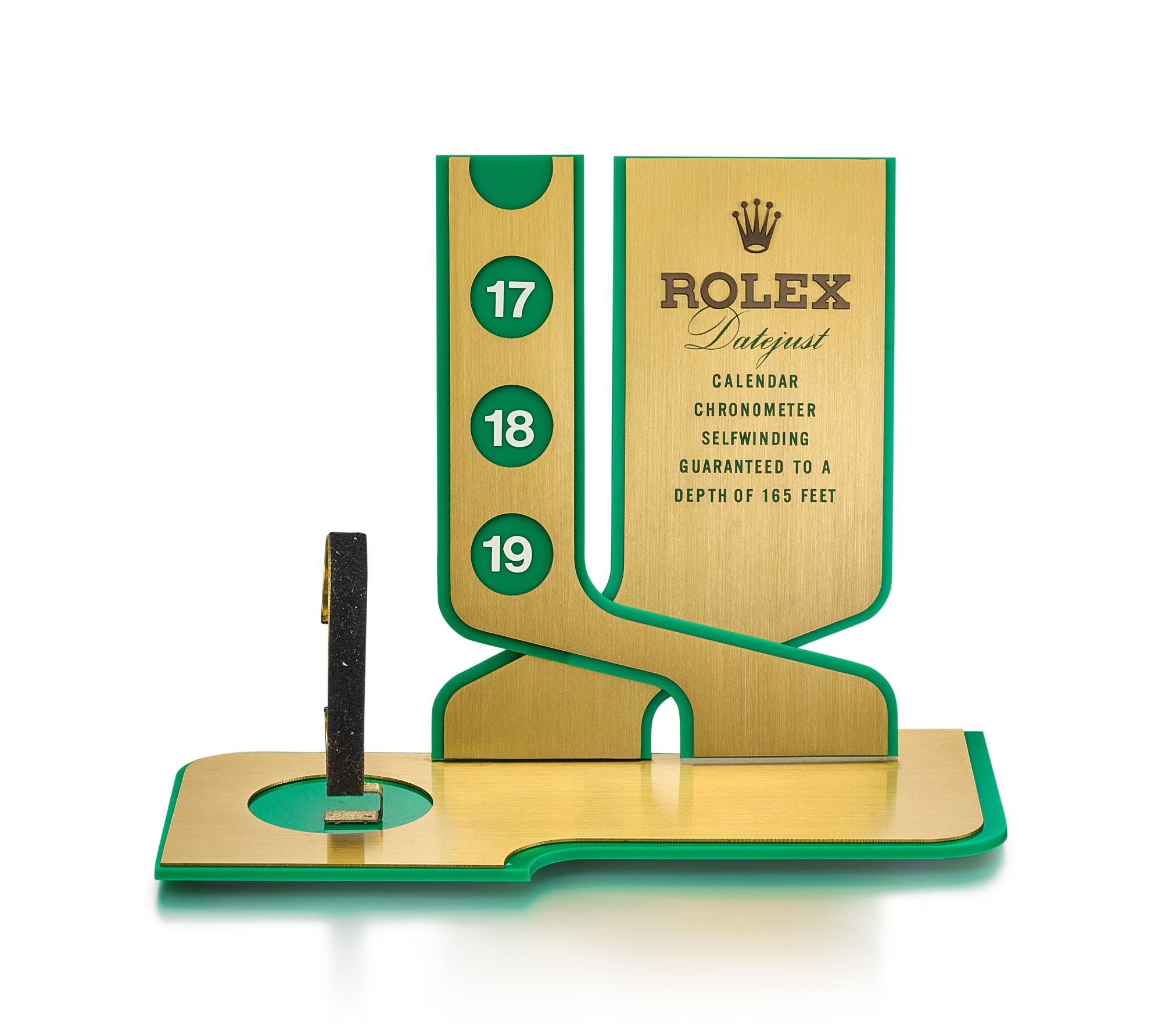 ROLEX | A GILT BRASS, GREEN ENAMEL AND PLASTIC RETAILER'S WINDOW ...