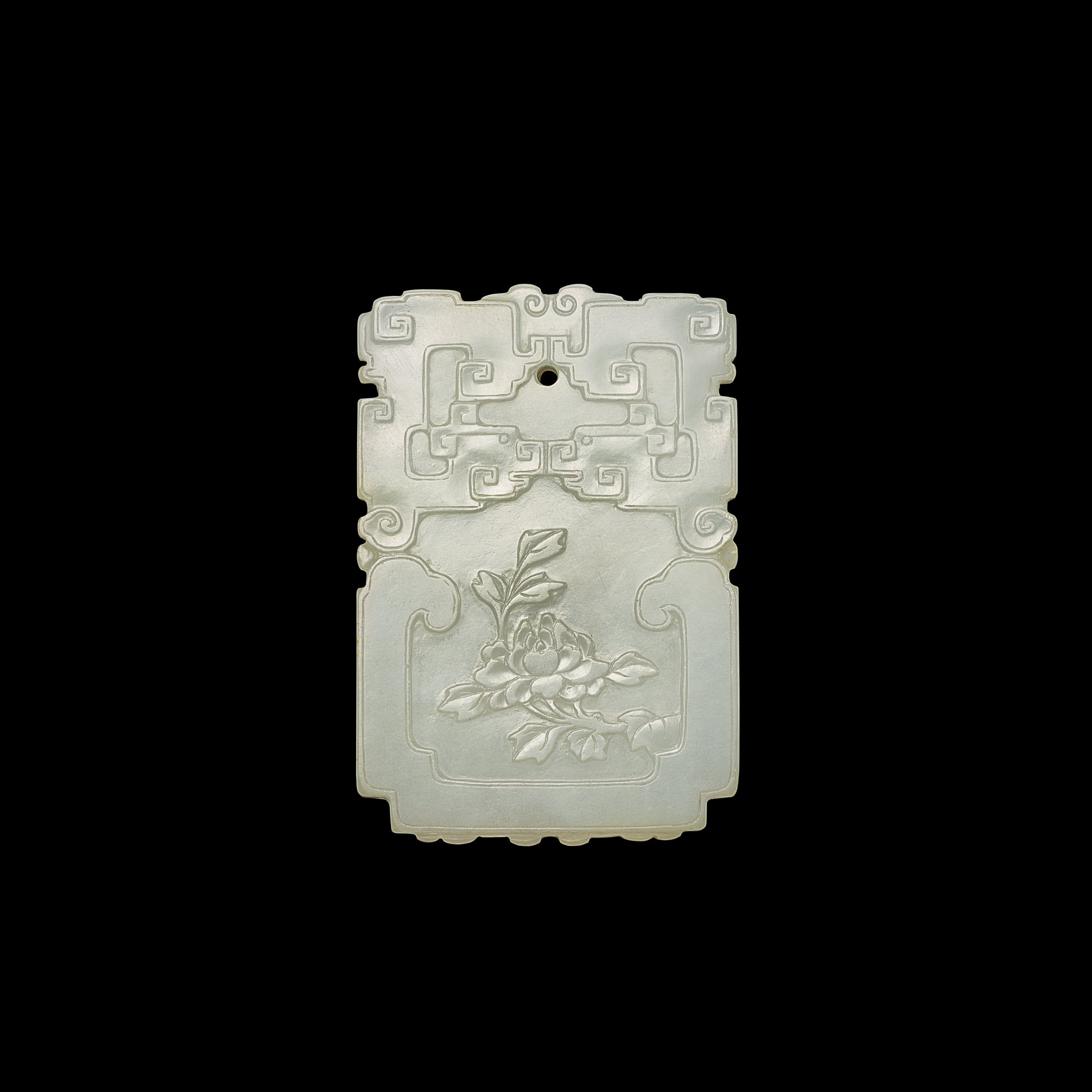 An inscribed white jade 'peony' plaque, Qing dynasty, 18th century ...