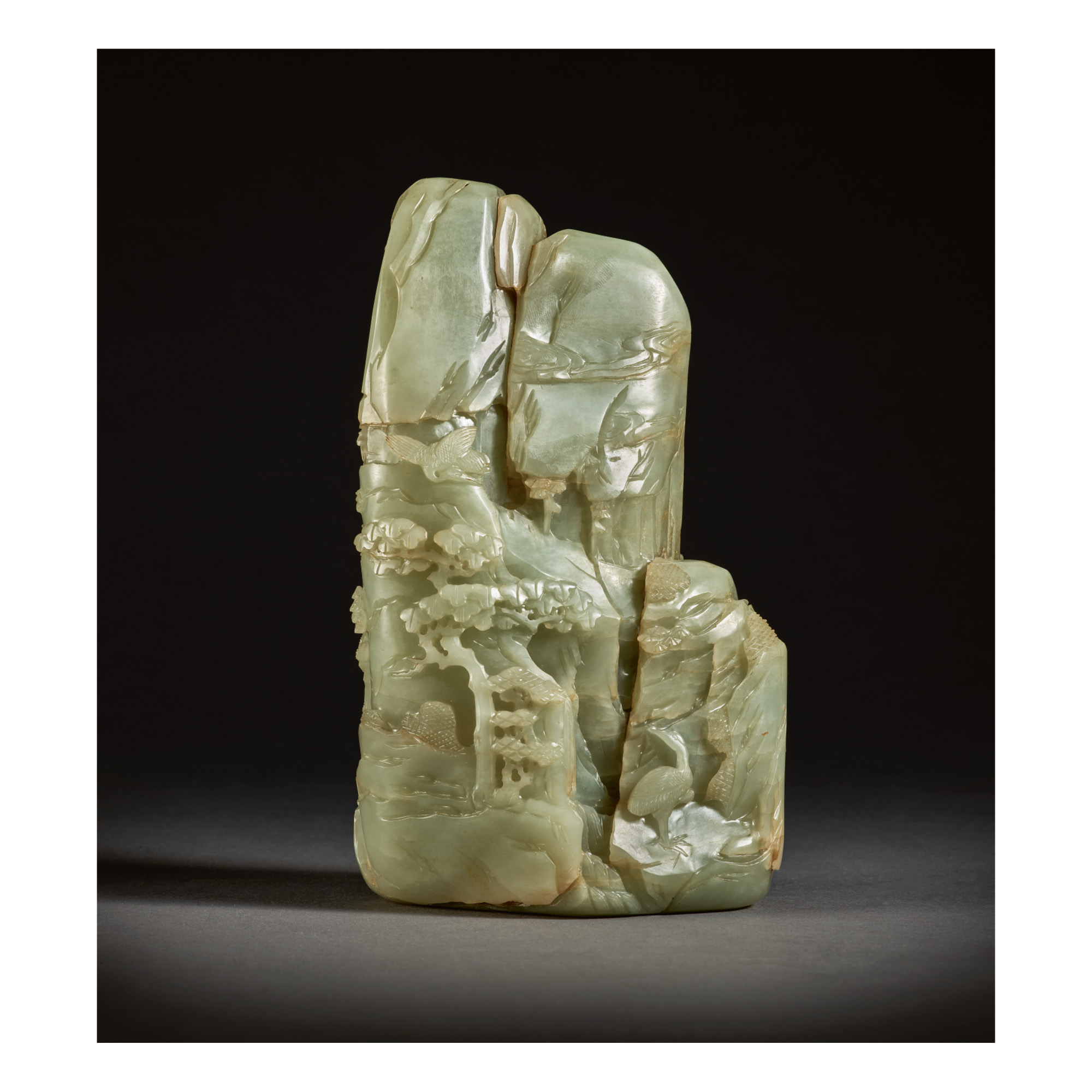 A LARGE PALE GREEN JADE 'IMMORTALS' MOUNTAIN, QING DYNASTY, QIANLONG ...