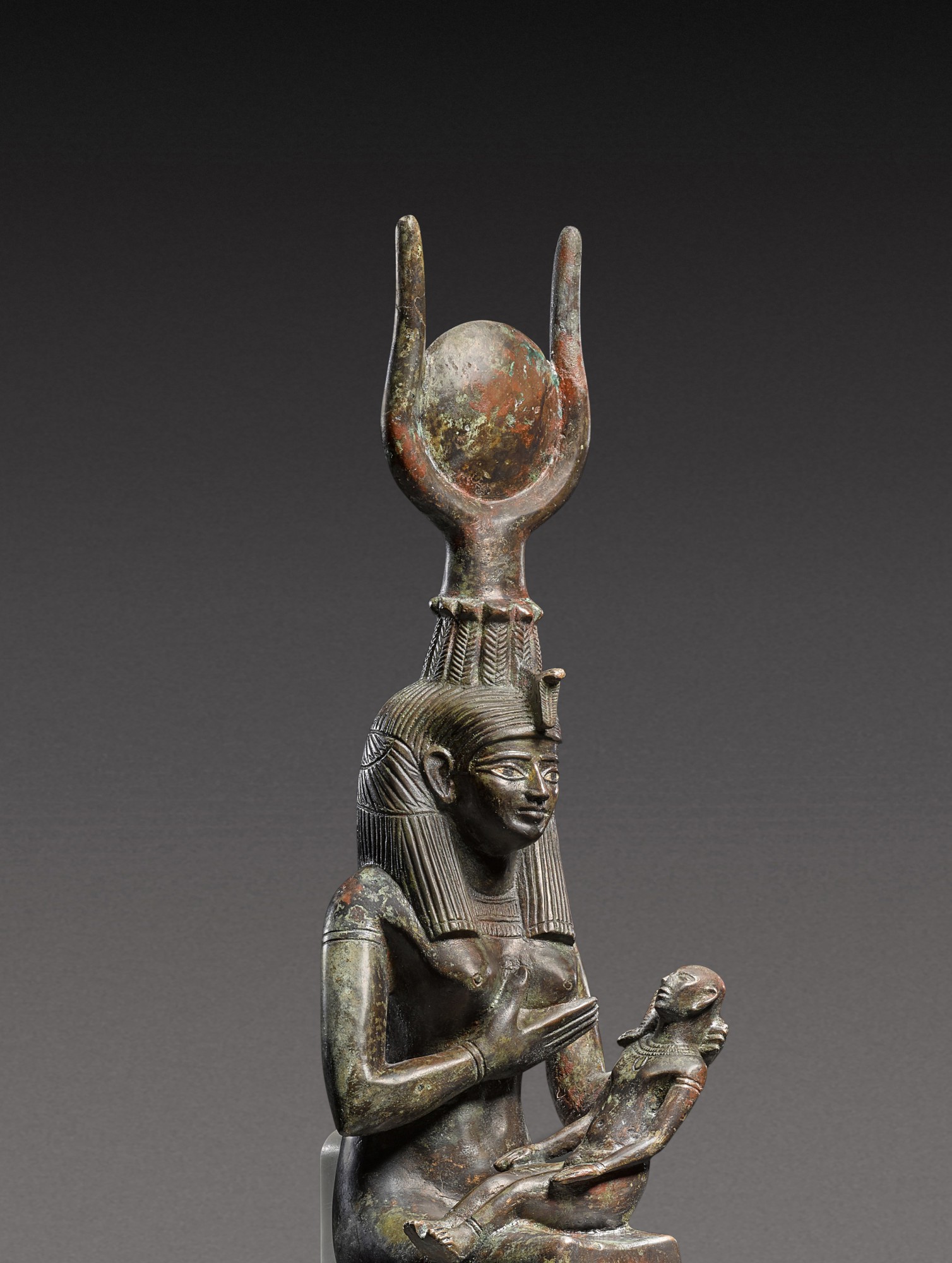 A Large Egyptian Bronze Figure of Isis with Horus, 25th/26th Dynasty ...