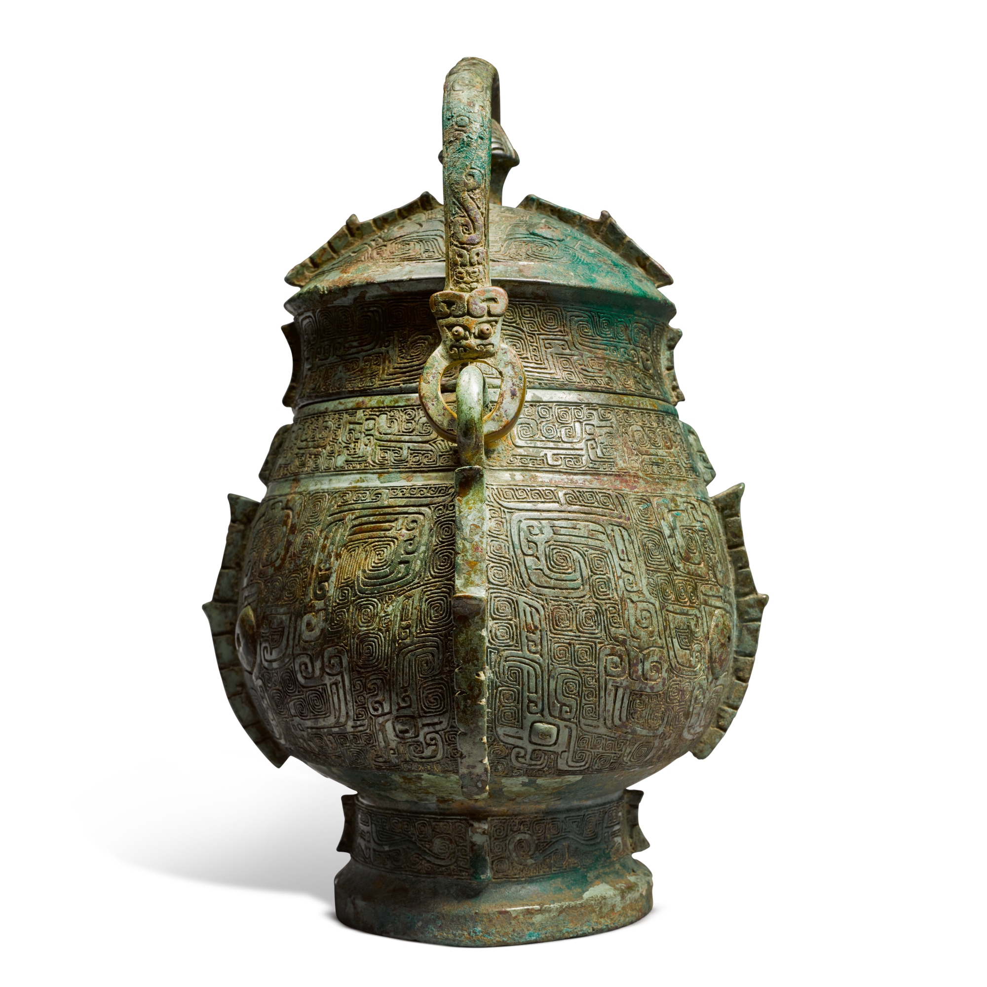 An extremely rare and important archaic bronze ritual wine vessel and ...