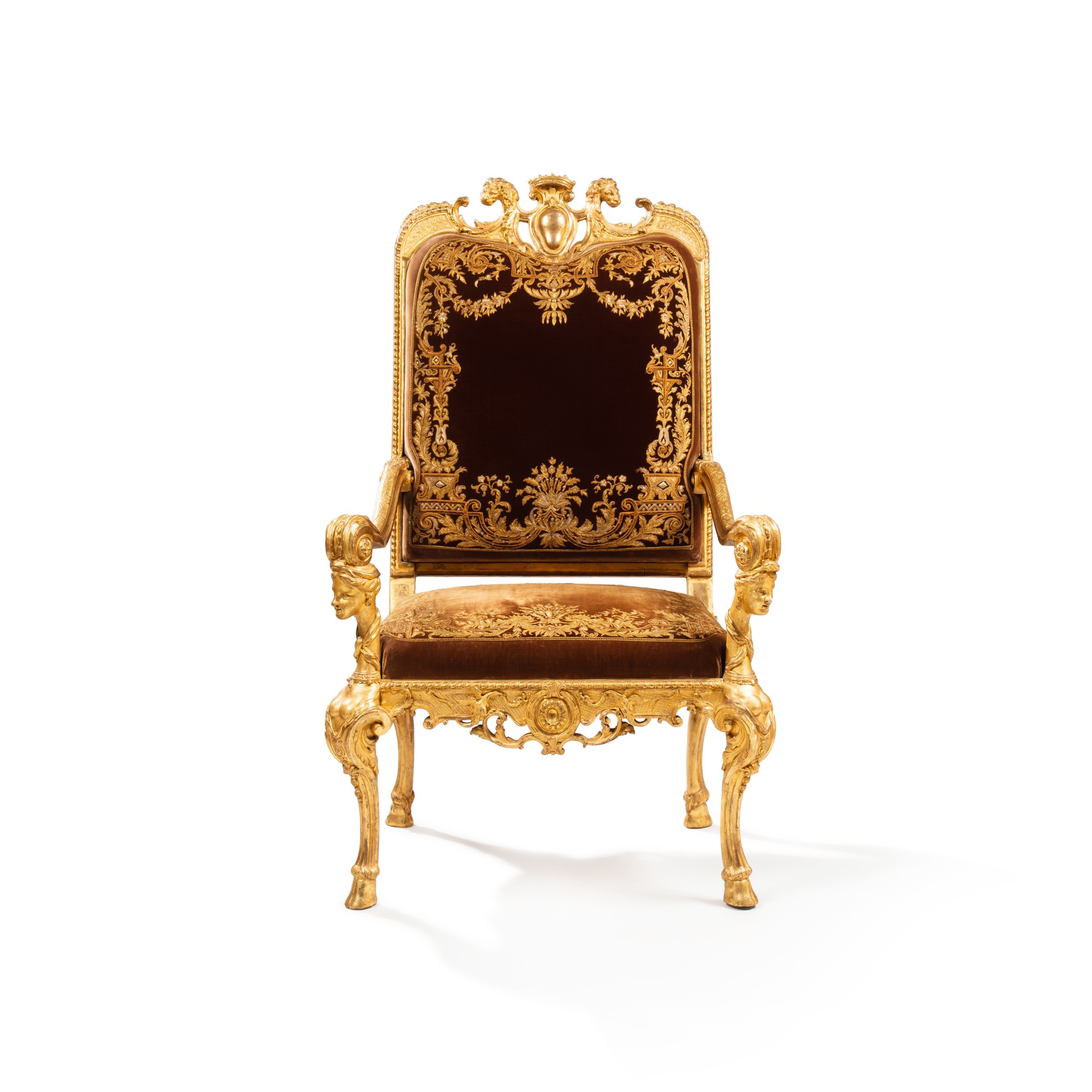 A Régence giltwood fauteuil, circa 1710-1720, after the designs of ...