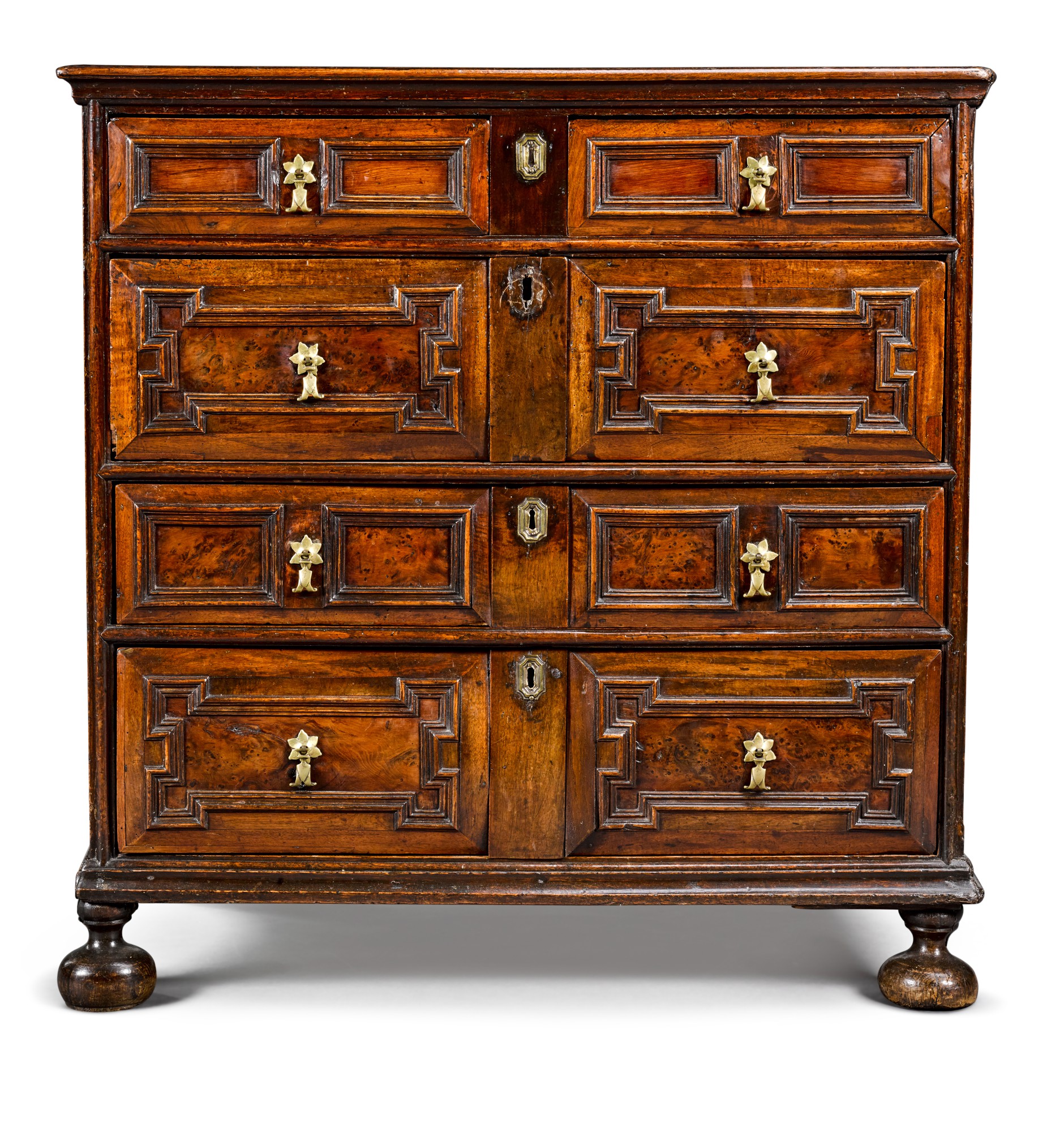 A Charles II oak, walnut and yew veneered chest of drawers, circa 1690 ...