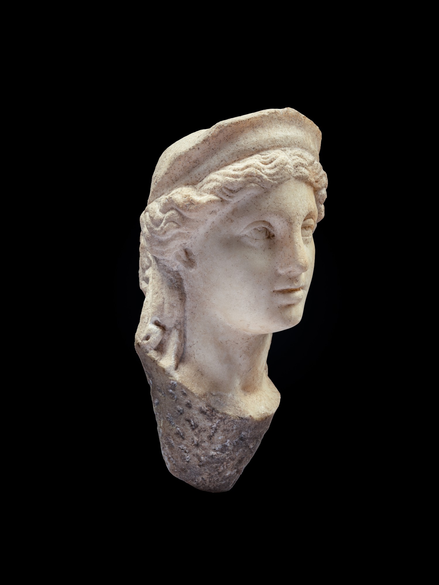 A Roman Marble Head of a Goddess, circa mid to late 2nd Century A.D ...