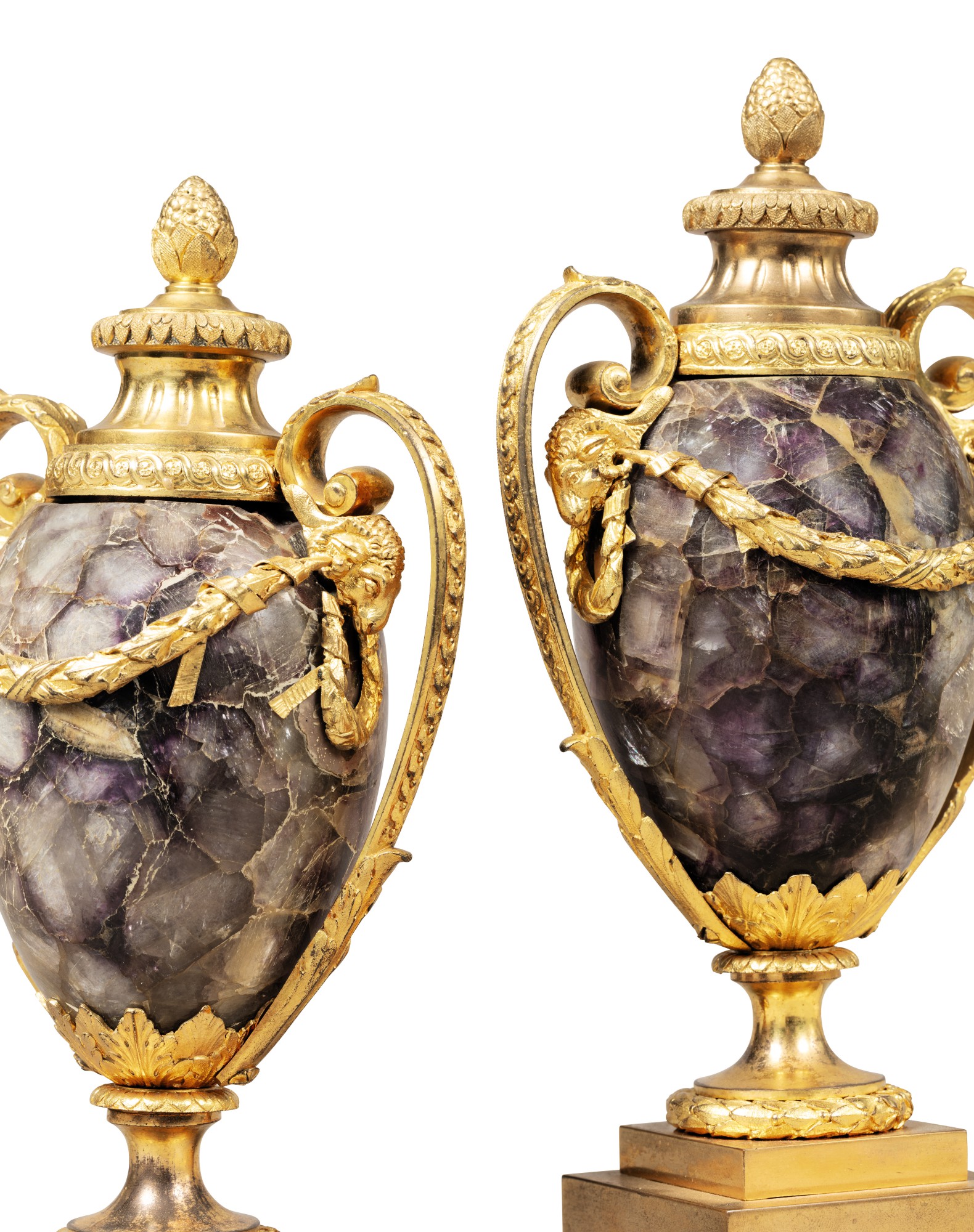 A pair of gilt-bronze-mounted blue-john candle-vases, in the manner of ...