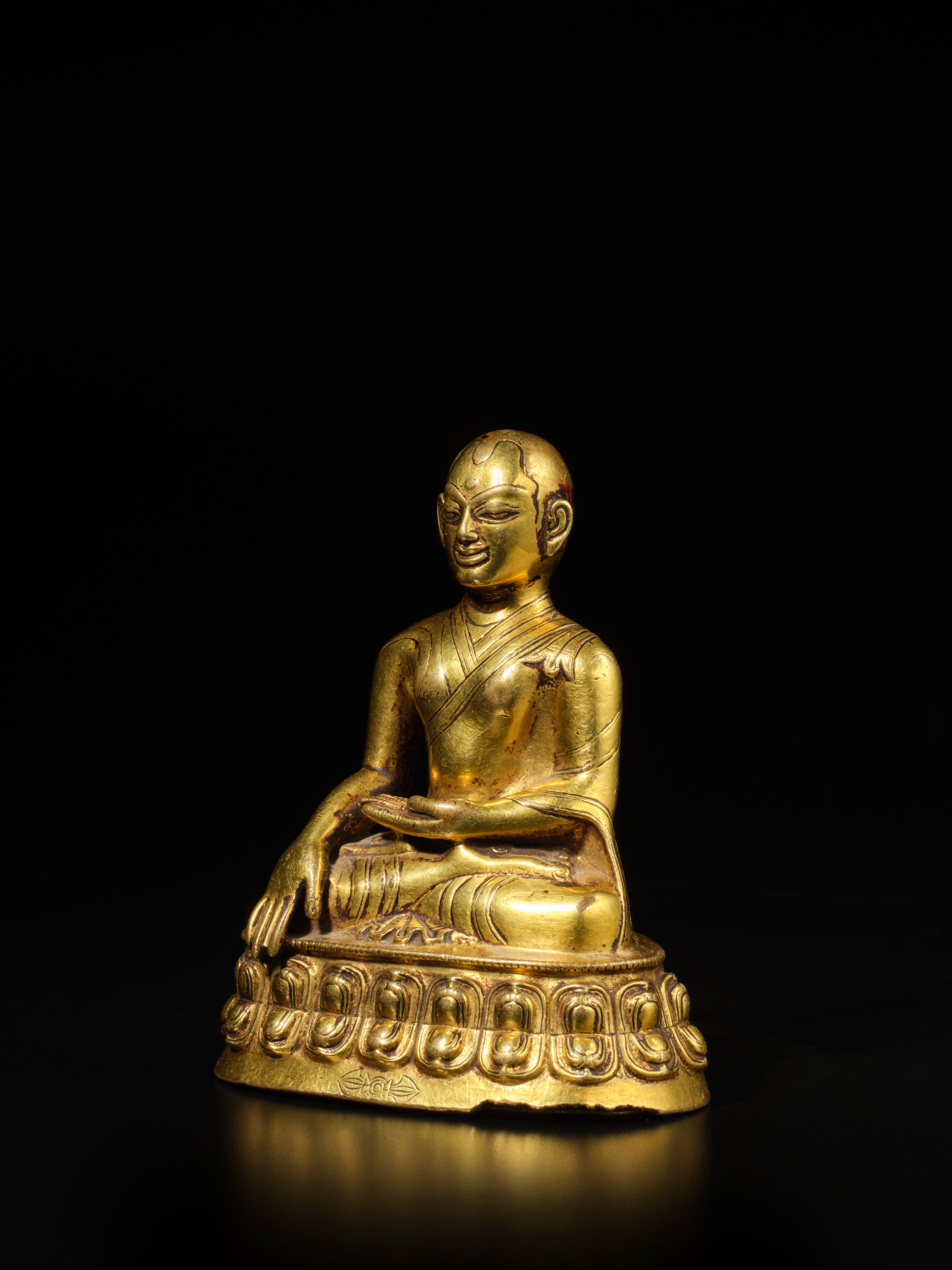 A gilt-copper alloy figure of Jigten Sumgon Rinchen Pel, Tibet, 13th ...