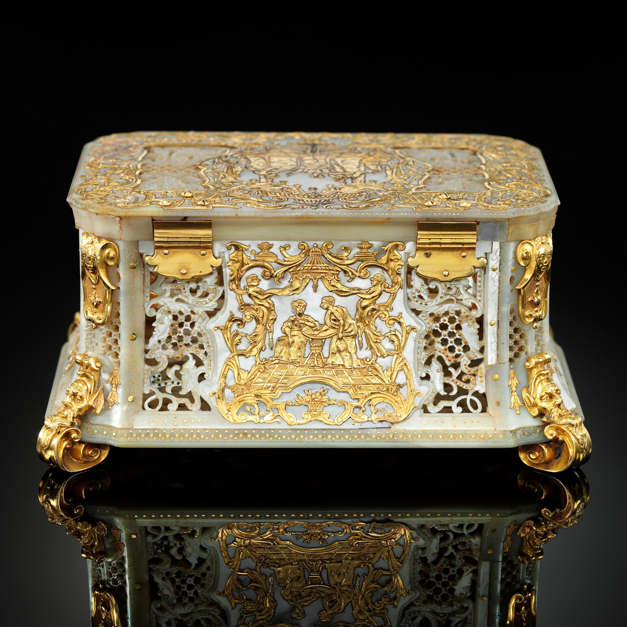 A mother of pearl casket with gold appliqué, mounts and piqué point ...