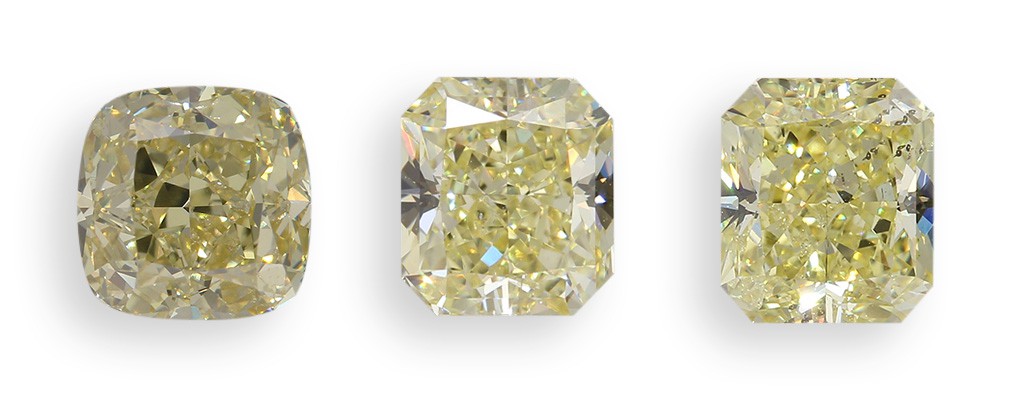 A Group of Three Fancy Yellow Diamonds Each Weighing 2.01 Carats ...