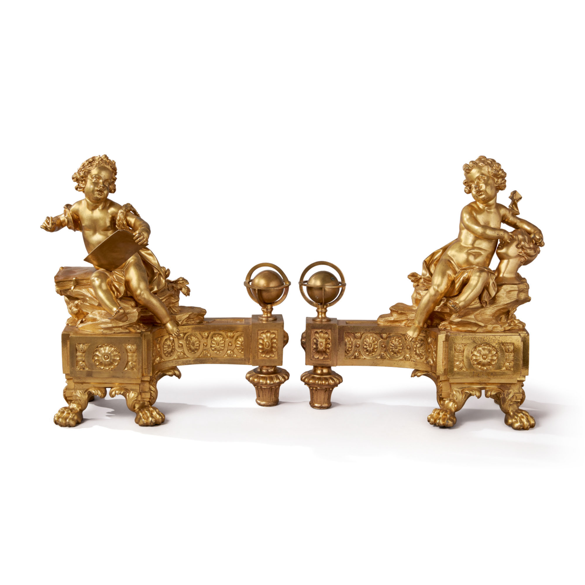 A PAIR OF LOUIS XVI GILT-BRONZE CHENETS REPRESENTING LITERATURE AND ...