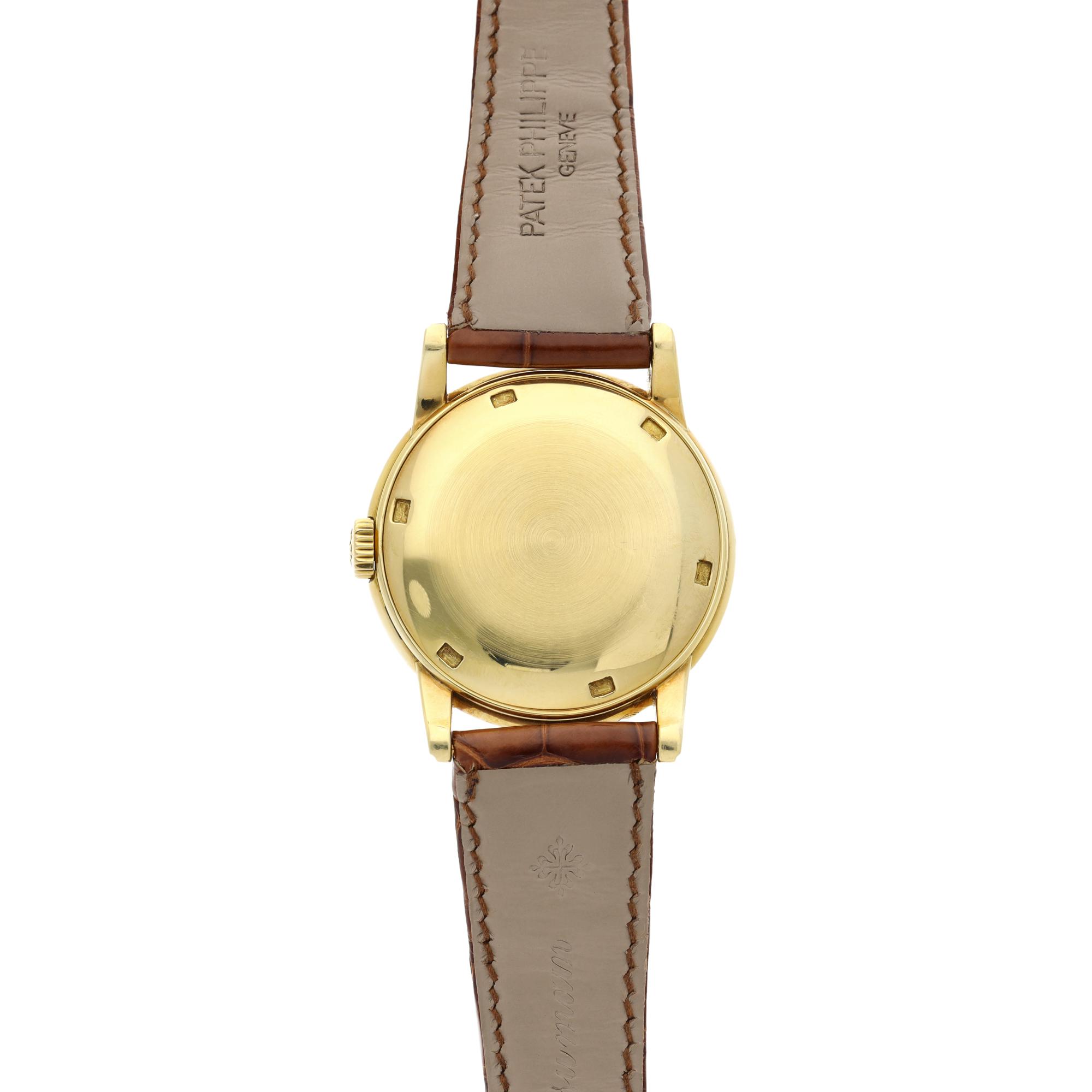 Reference 2438/1 A yellow gold perpetual calendar wristwatch with moon ...