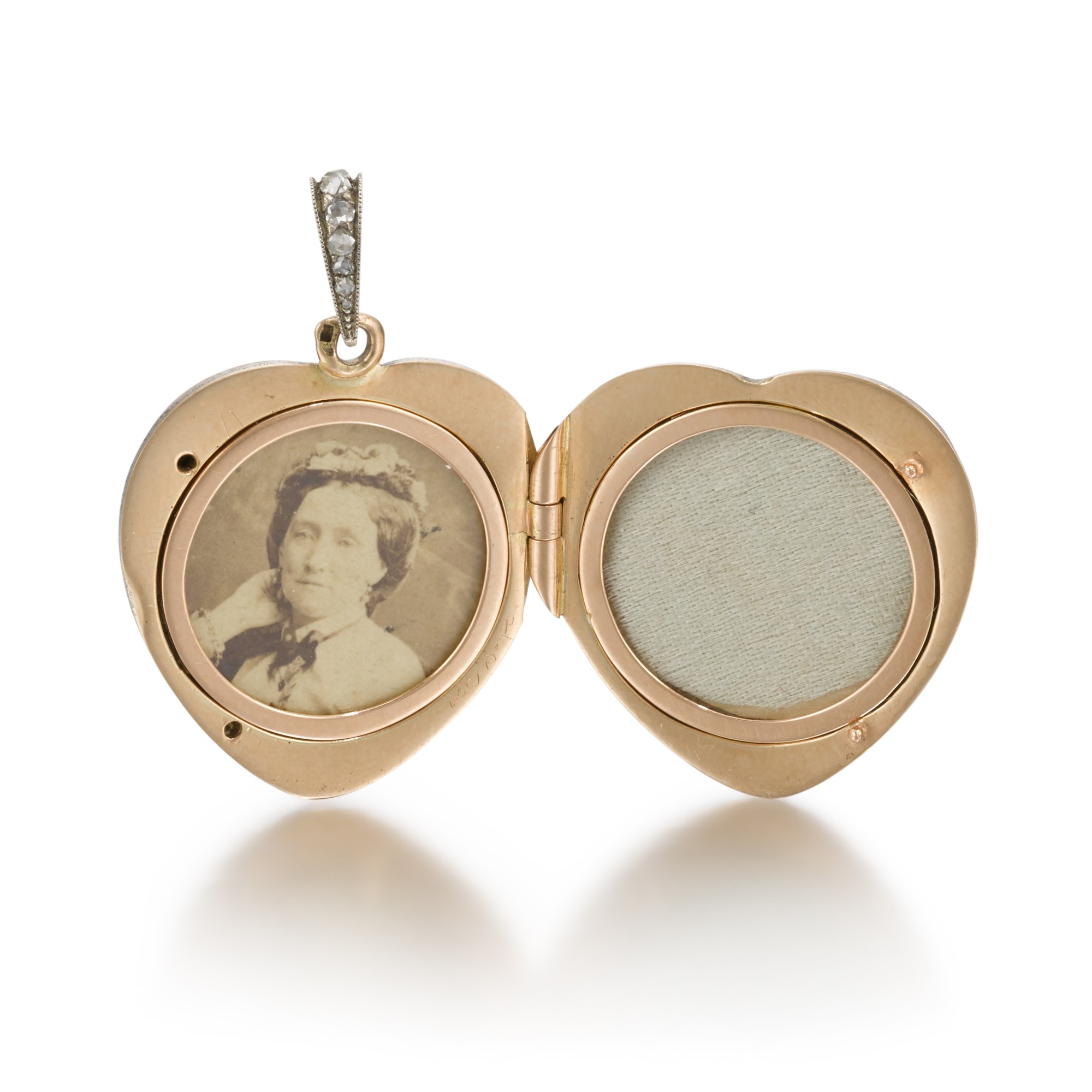 A Fabergé jewelled silver-gilt and guilloché enamel heart-shaped locket ...