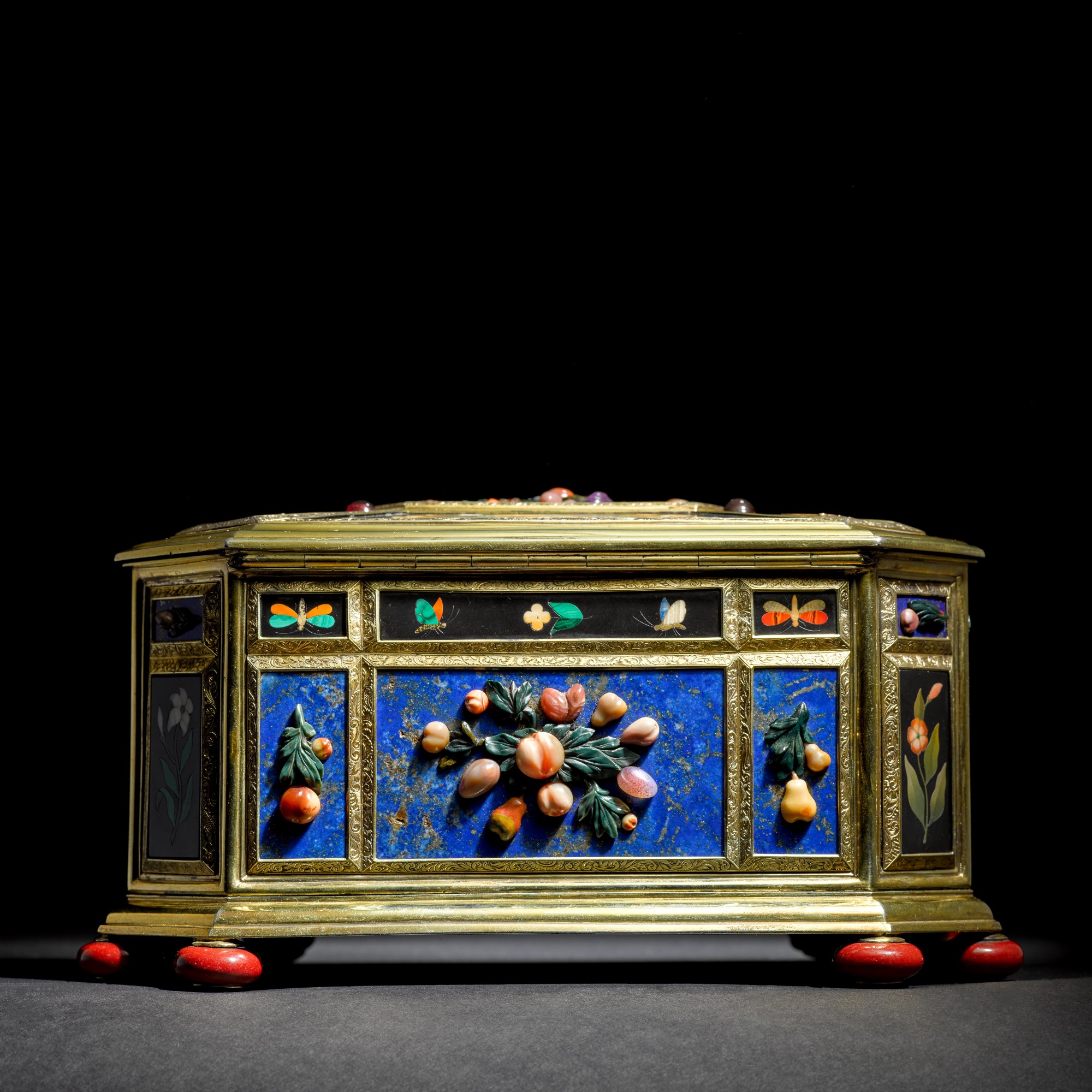A Continental silver-gilt, carved hardstone, pietre dure inlaid and ...
