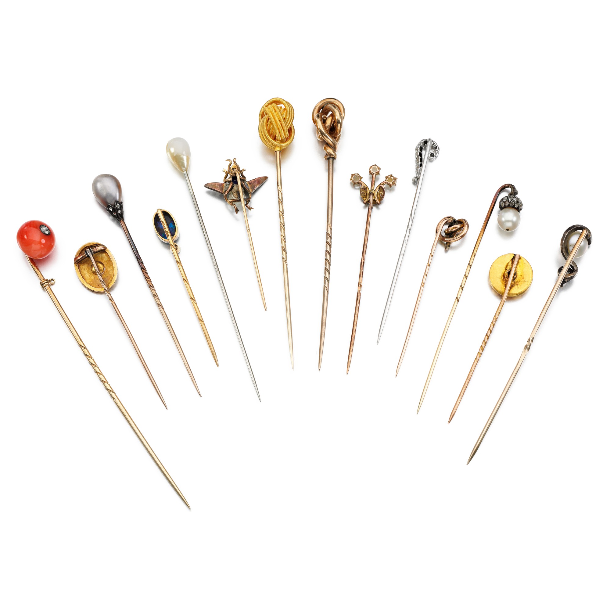 Fourteen gem set stick pins, late 19th to early 20th century and later ...