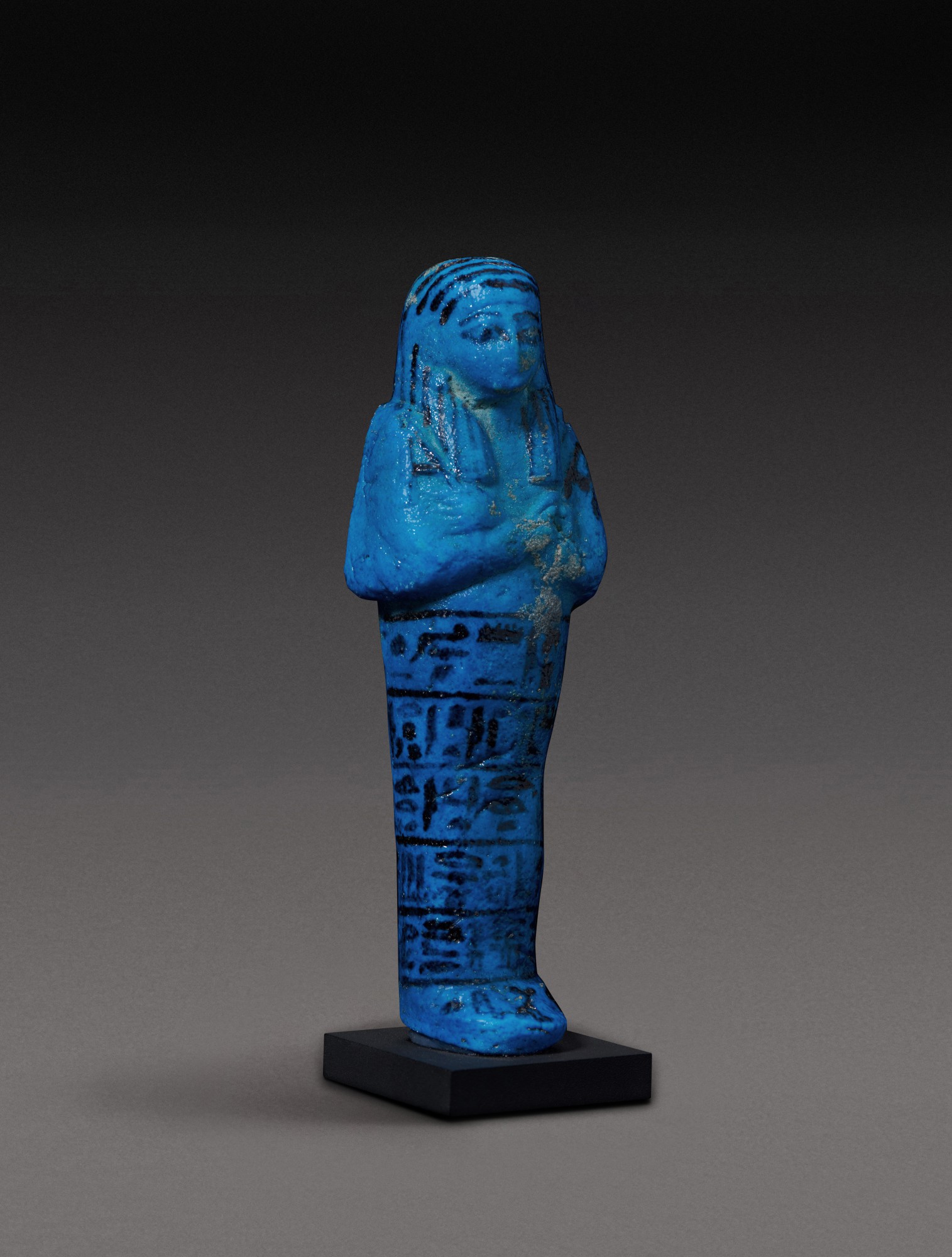 An Egyptian Brilliant Blue Faience Ushabti of Nesi-Khonsu, Principal ...