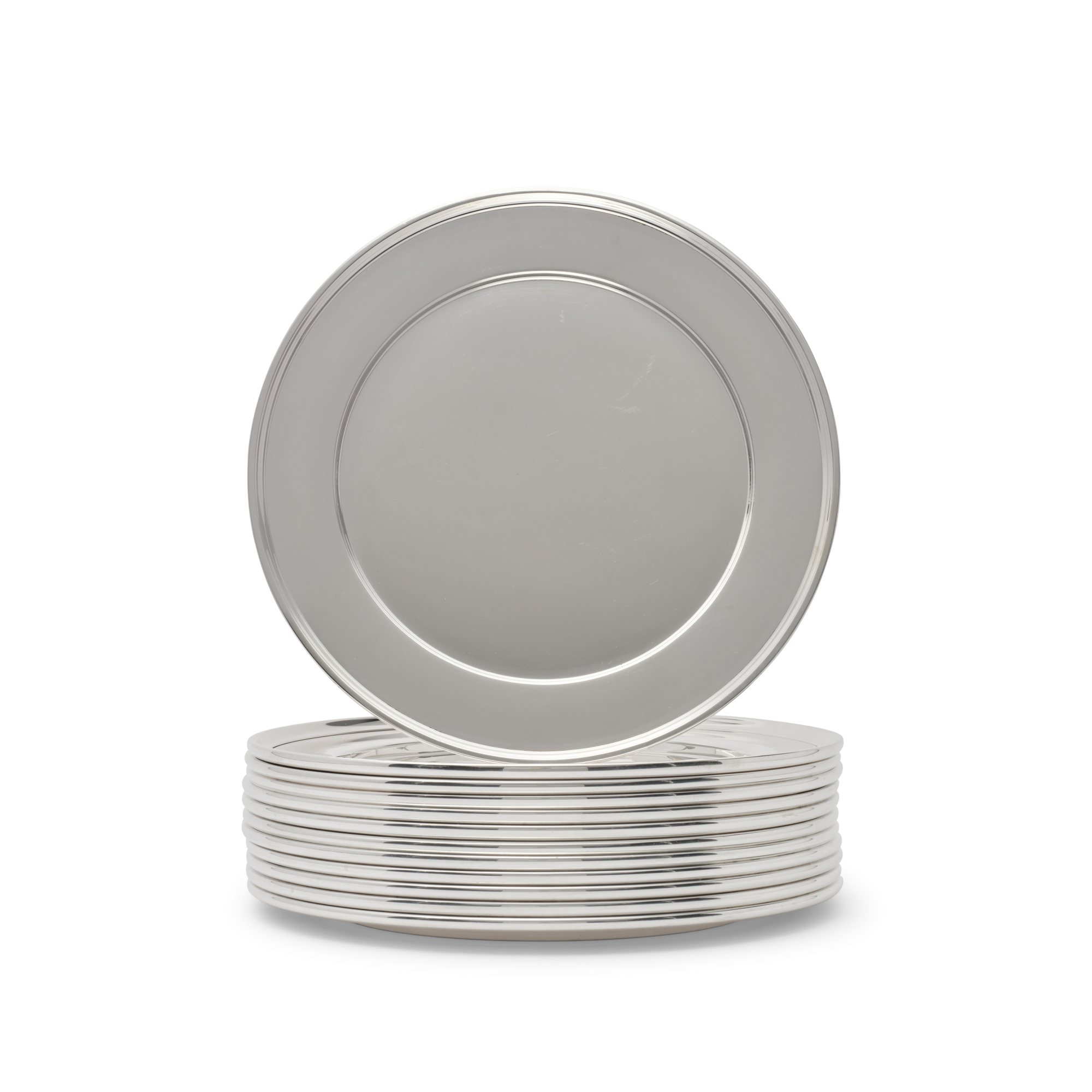 A Set of Twelve American Silver Chargers, Manchester Silver Co ...