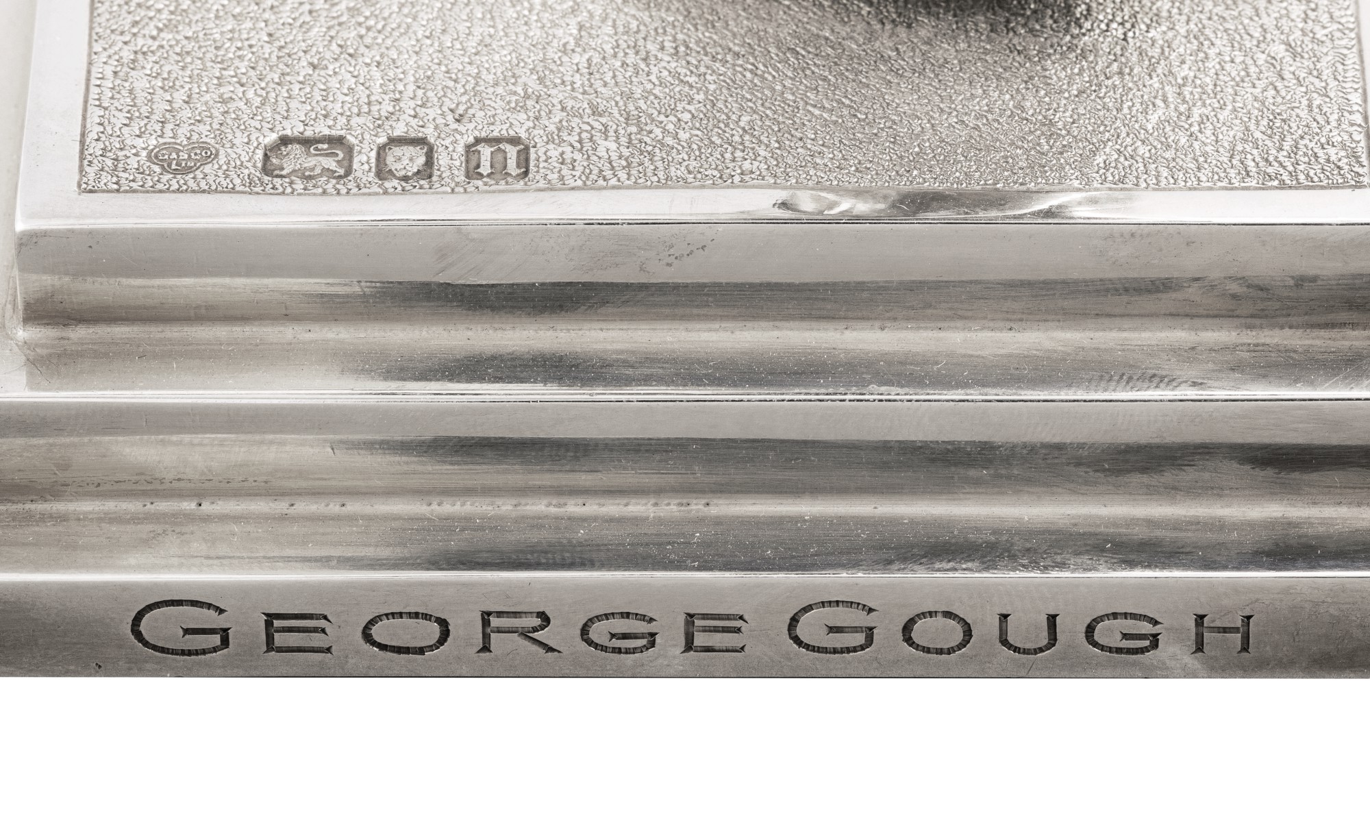 A silver presentation statuette of a medieval minstrel, Goldsmiths ...