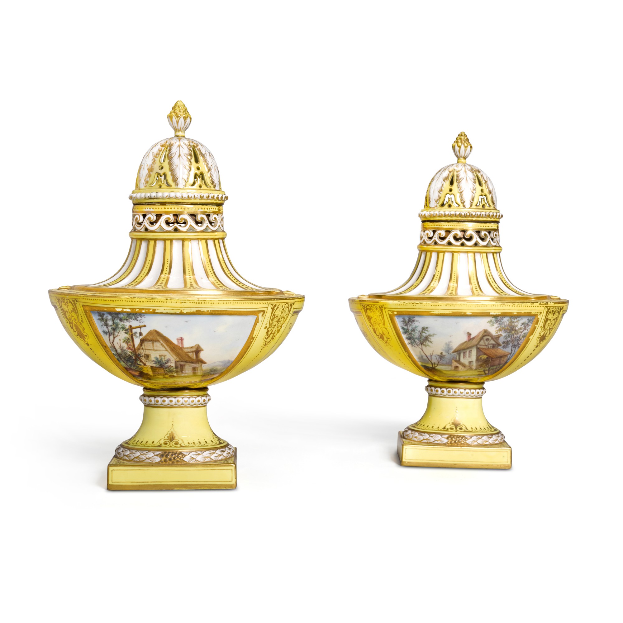 A pair of Sèvres-style yellow-ground pot-pourri vases and pierced ...