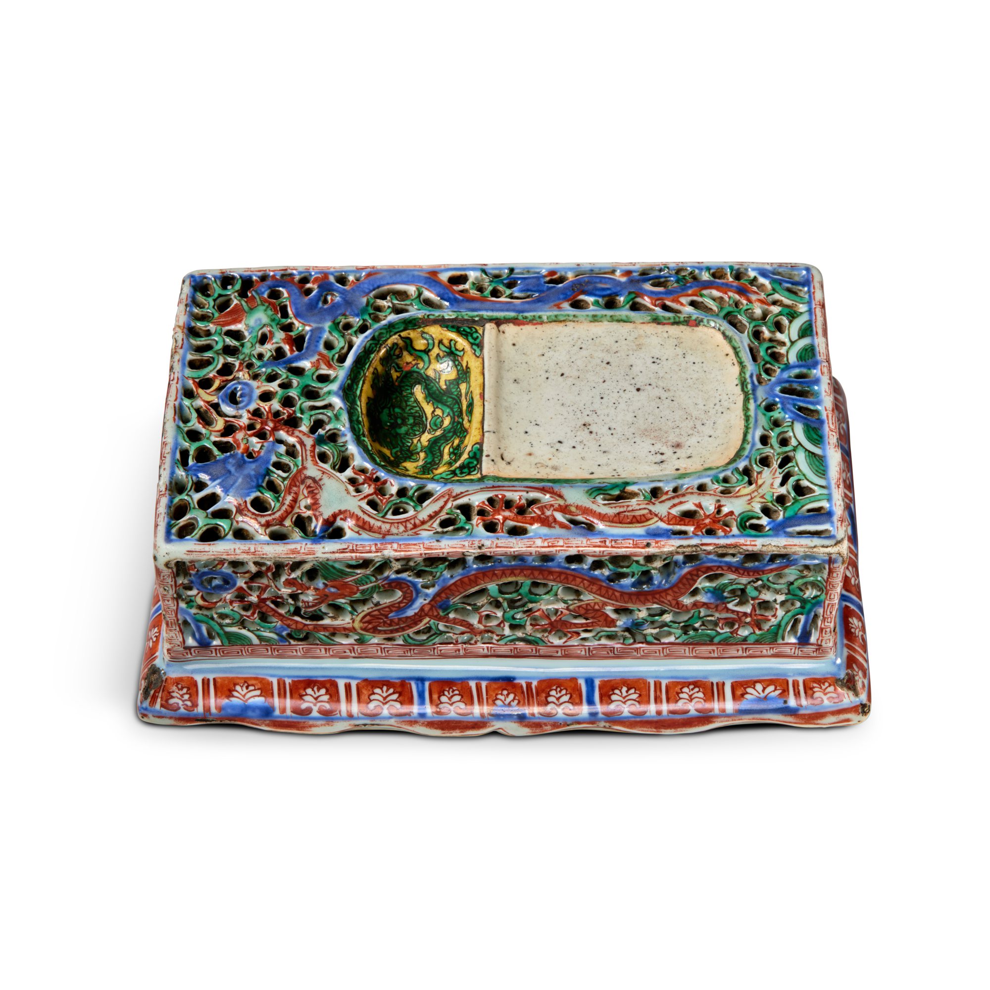 A rare wucai 'dragon' rectangular inkstone, Mark and period of Wanli ...