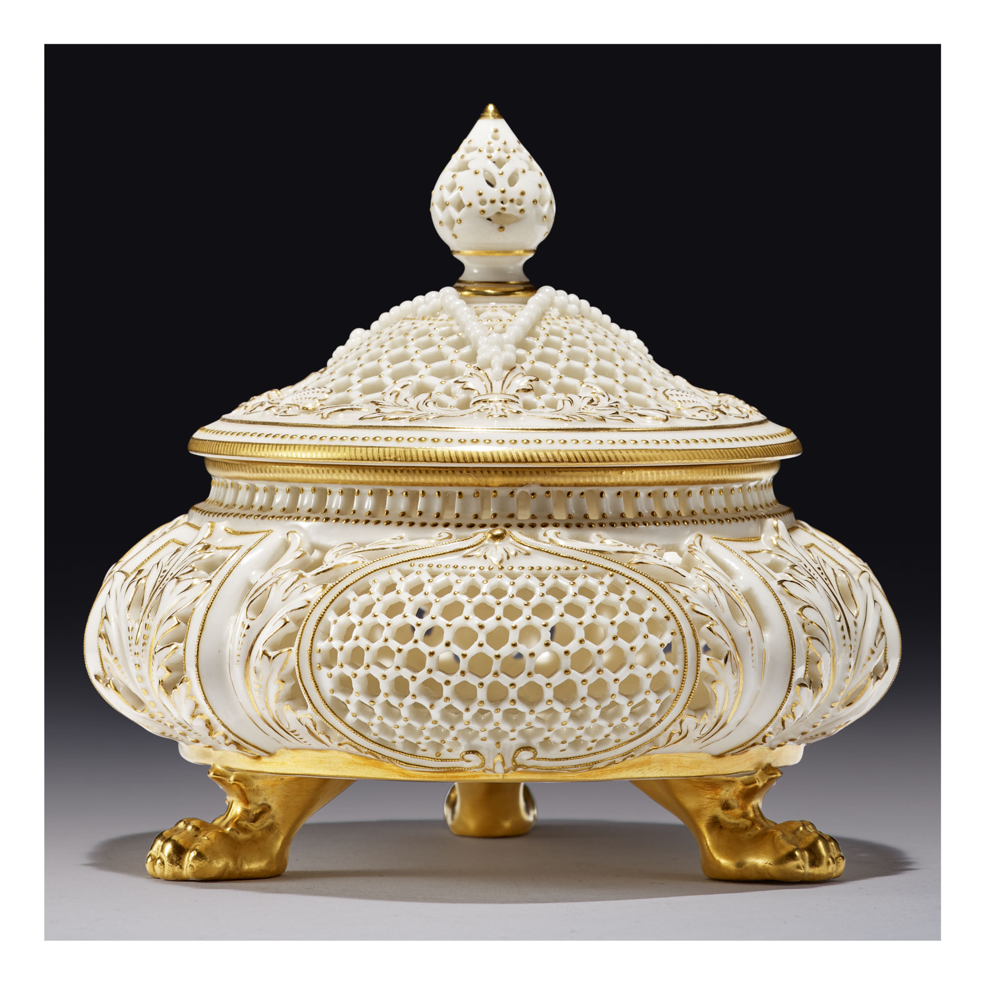 A ROYAL WORCESTER RETICULATED PORCELAIN CIRCULAR BOX AND COVER BY ...