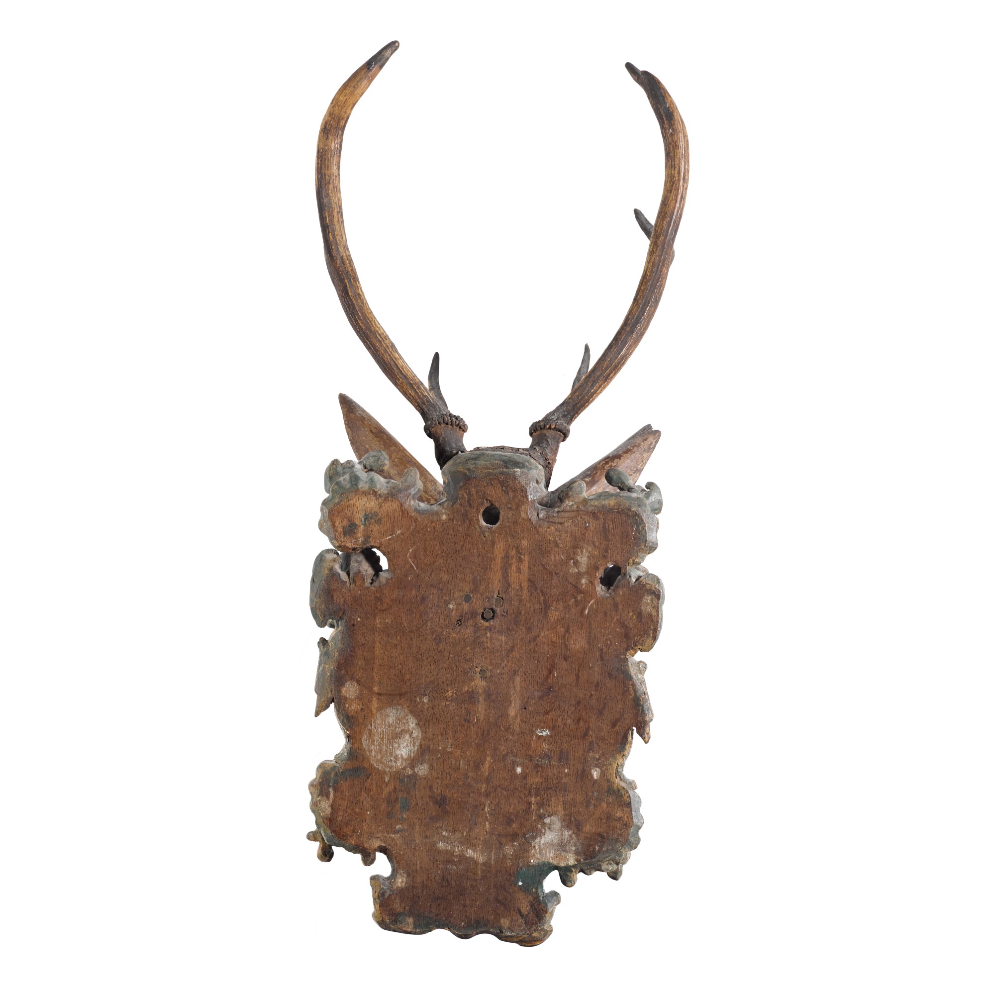 A pair of Continental carved and painted stags heads, probably German ...