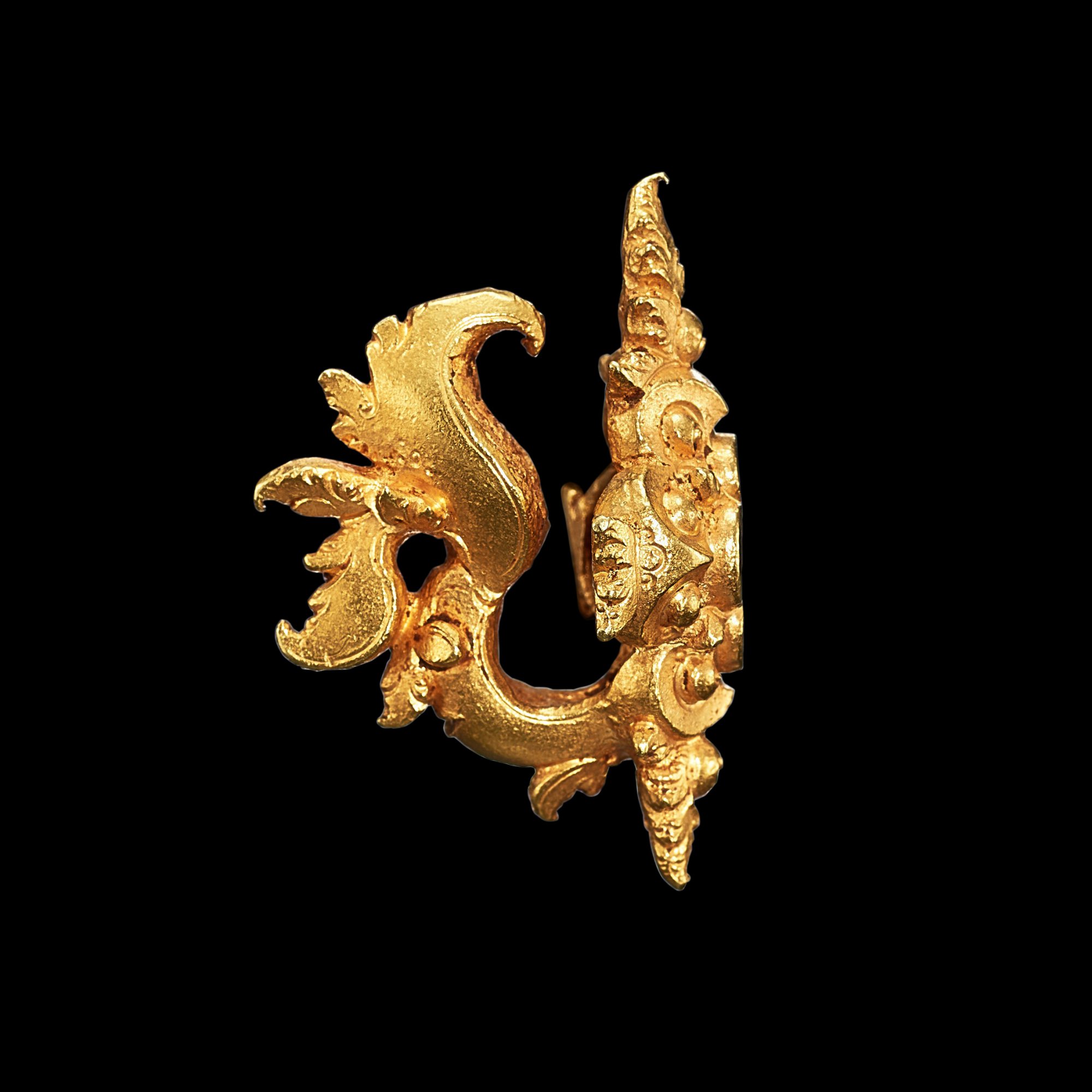 An elaborate solid gold earring Java, Indonesia, 7th - 12th century ...