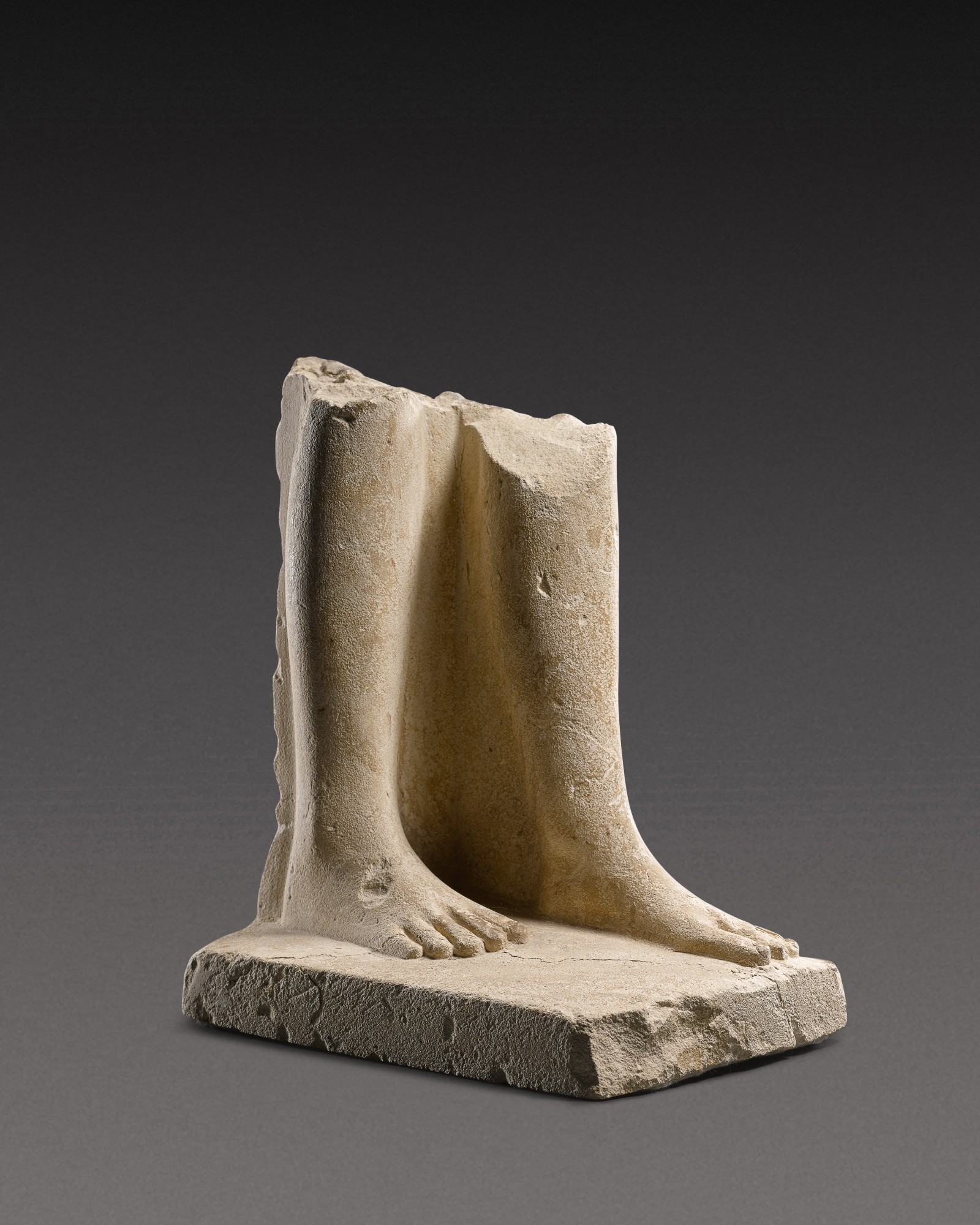An Egyptian Limestone Statue Fragment, 30th Dynasty/Ptolemaic Period ...