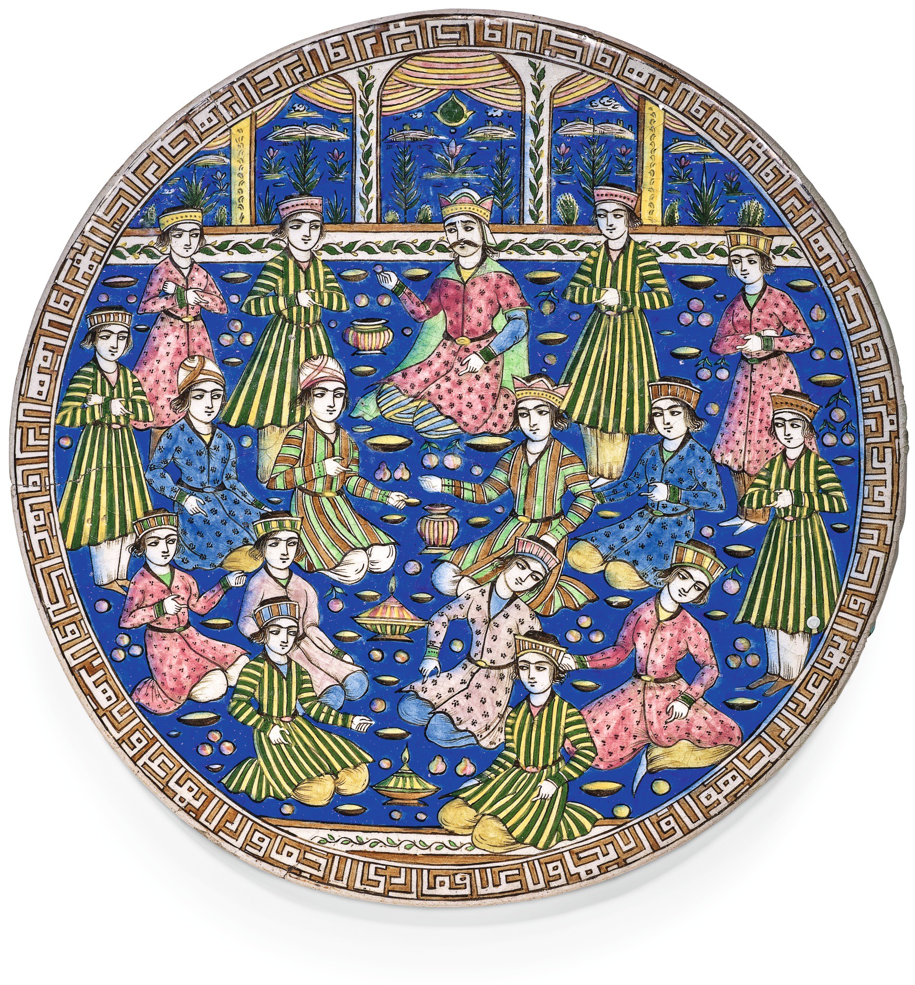 A LARGE QAJAR CIRCULAR POLYCHROME POTTERY TILE PANEL, PERSIA, 19TH ...