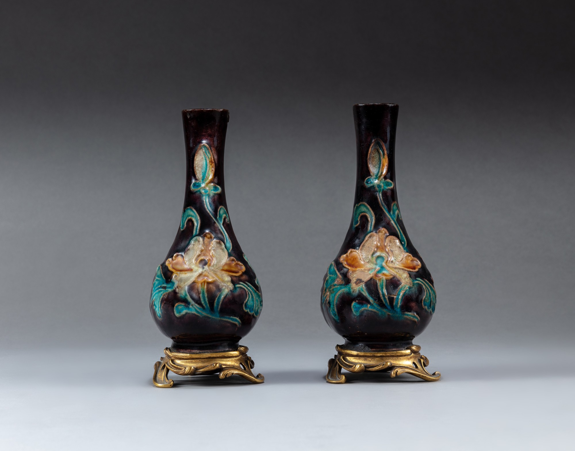 Two small fahua 'lotus' bottle vases, 16th-17th century, with 19th ...