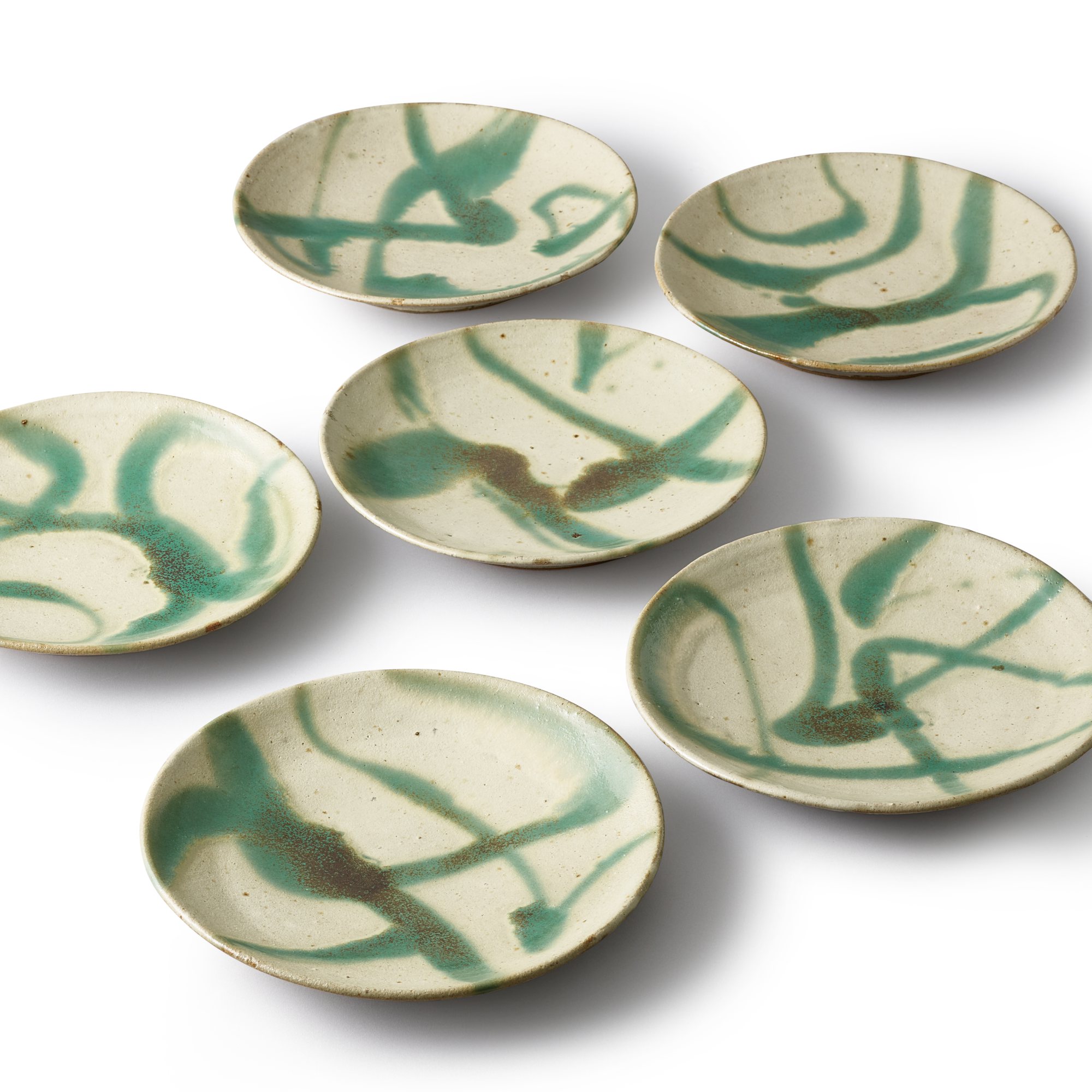 Hamada Shoji (1894-1978) A set of six green-splashed dishes, Japan ...