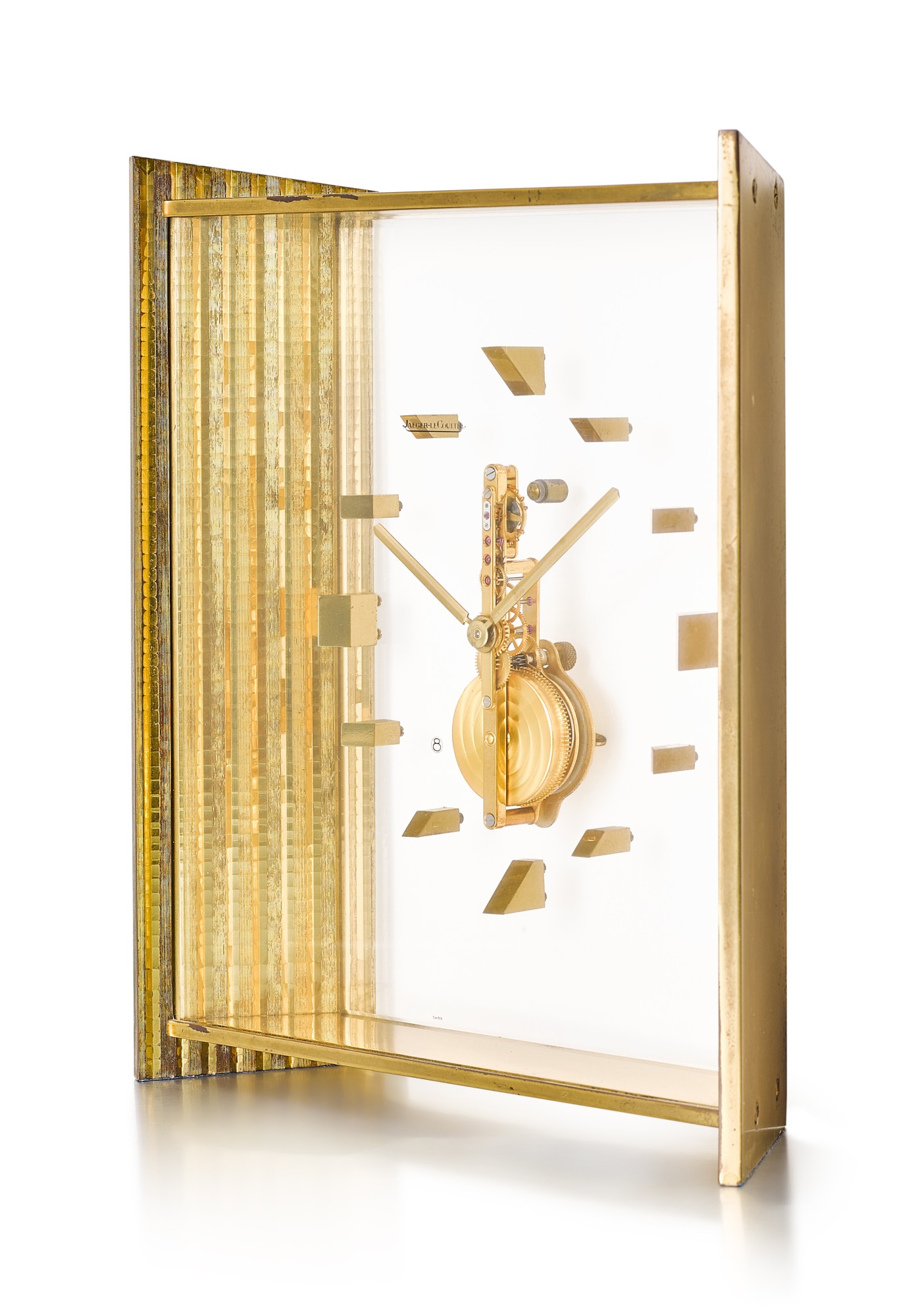 JAEGER-LECOULTRE | A GILT BRASS TABLE CLOCK WITH 8 DAYS POWER RESERVE ...