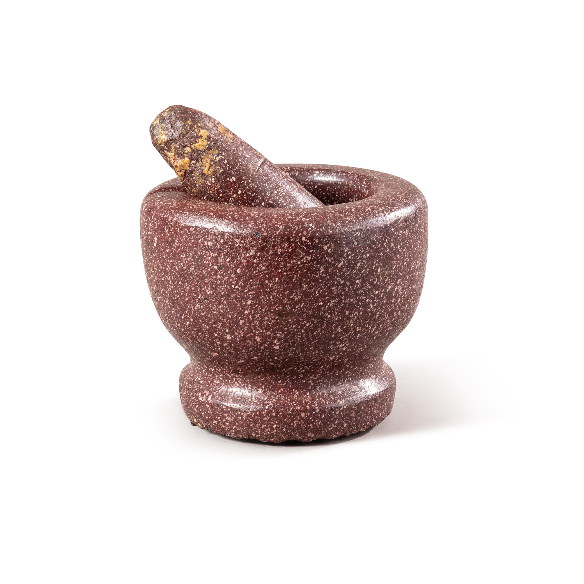 An Egyptian porphyry mortar and pestle, Italy, probably 17th century ...