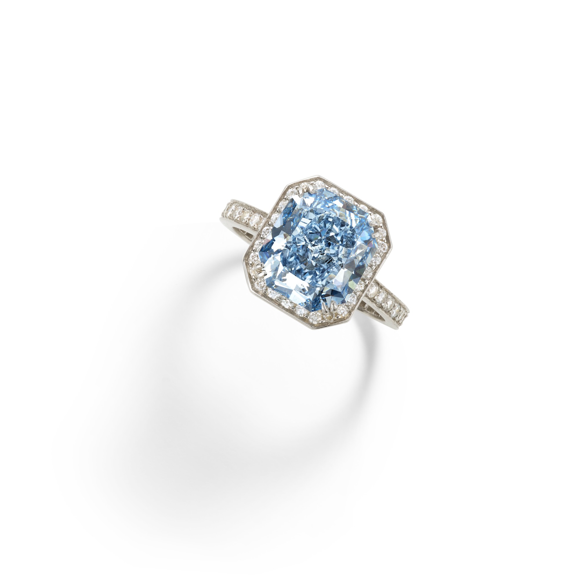 A Highly Important Fancy Intense Blue Diamond and Diamond Ring ...