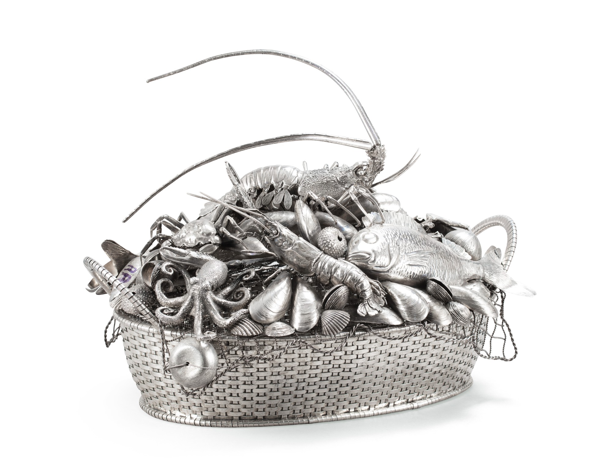 A large Italian silver centretable shaped as a fishing basket, Mario ...