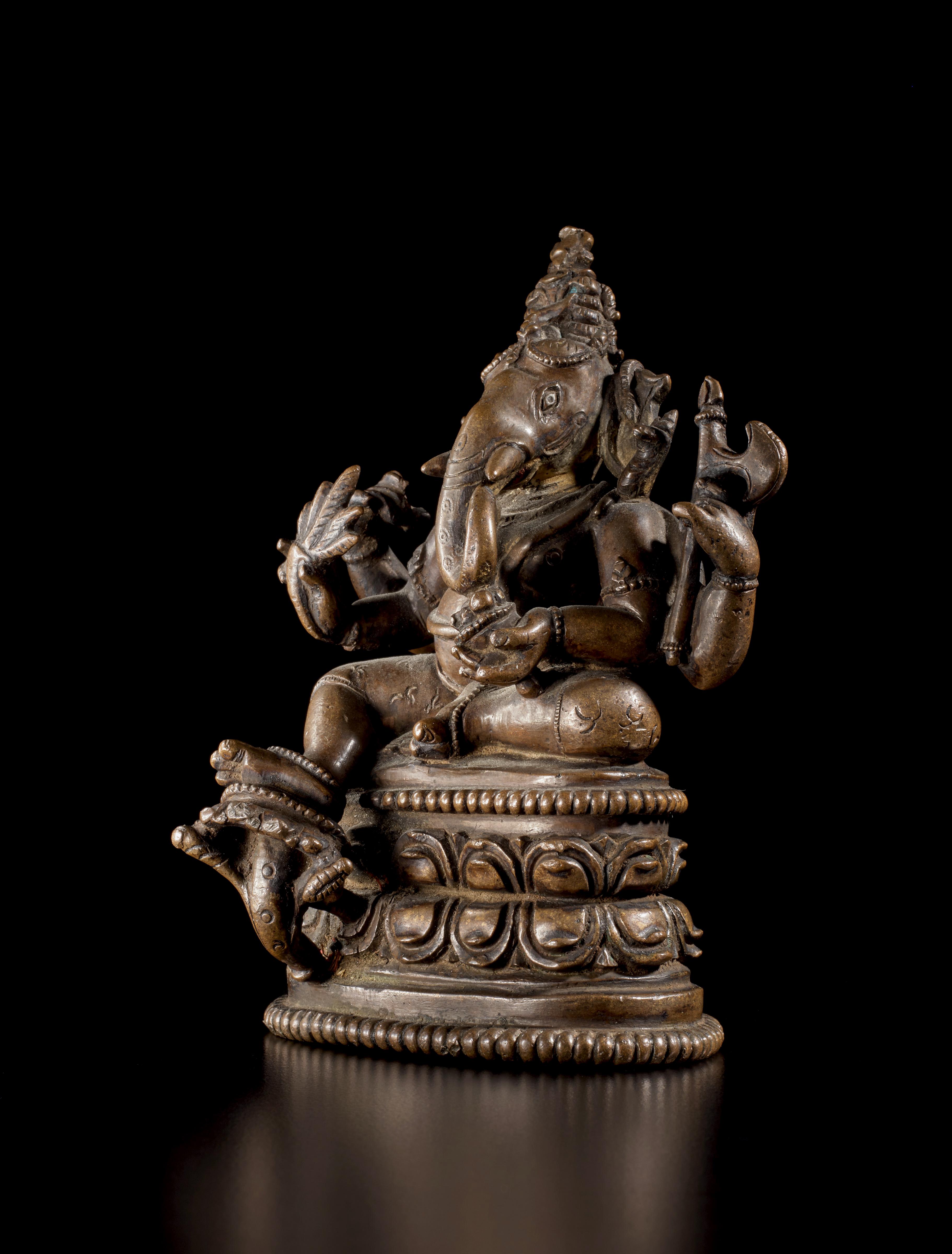 A copper alloy figure of Ganesha, Eastern India, Pala period, circa ...