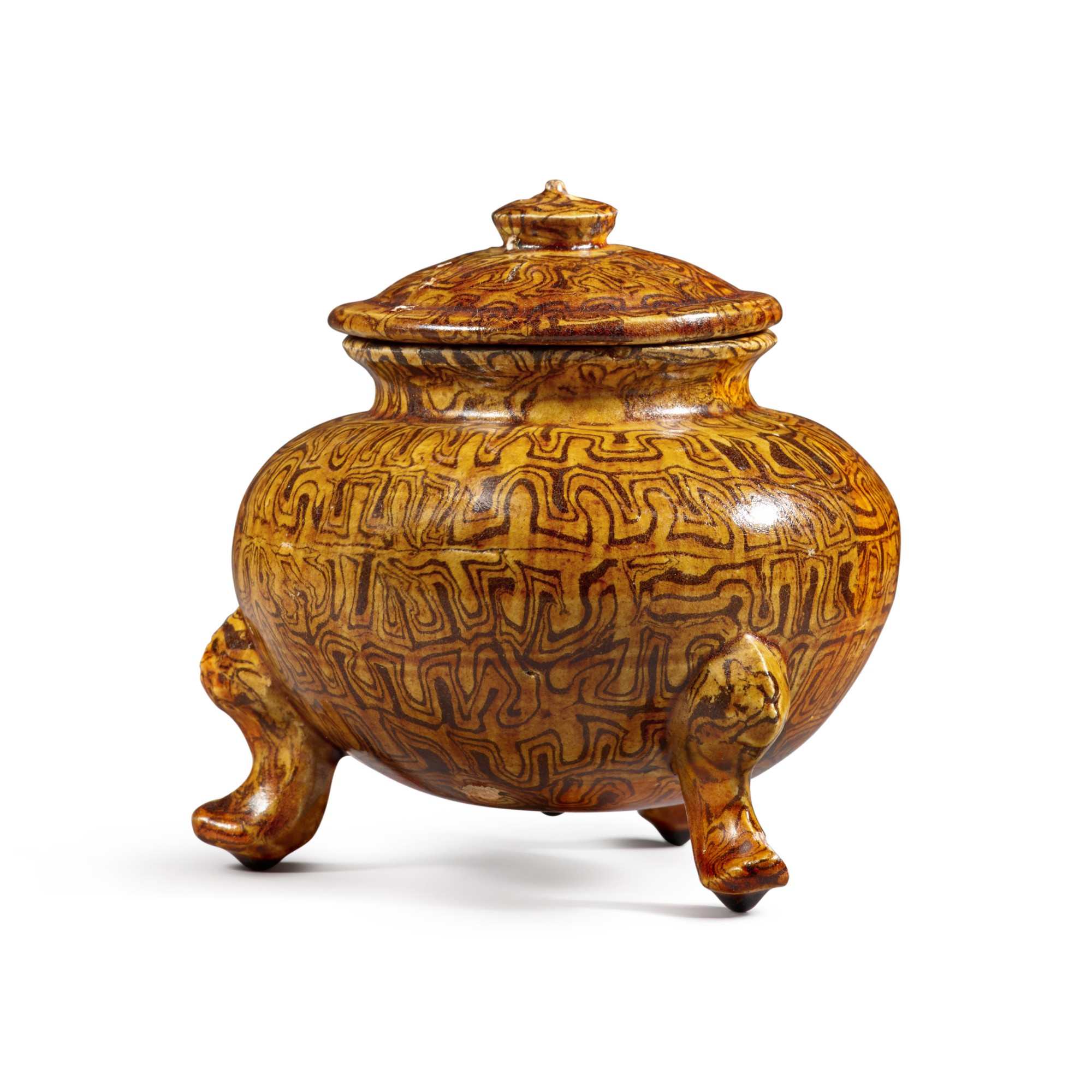 A rare amber-glazed marbled pottery tripod jar and cover, Tang dynasty ...