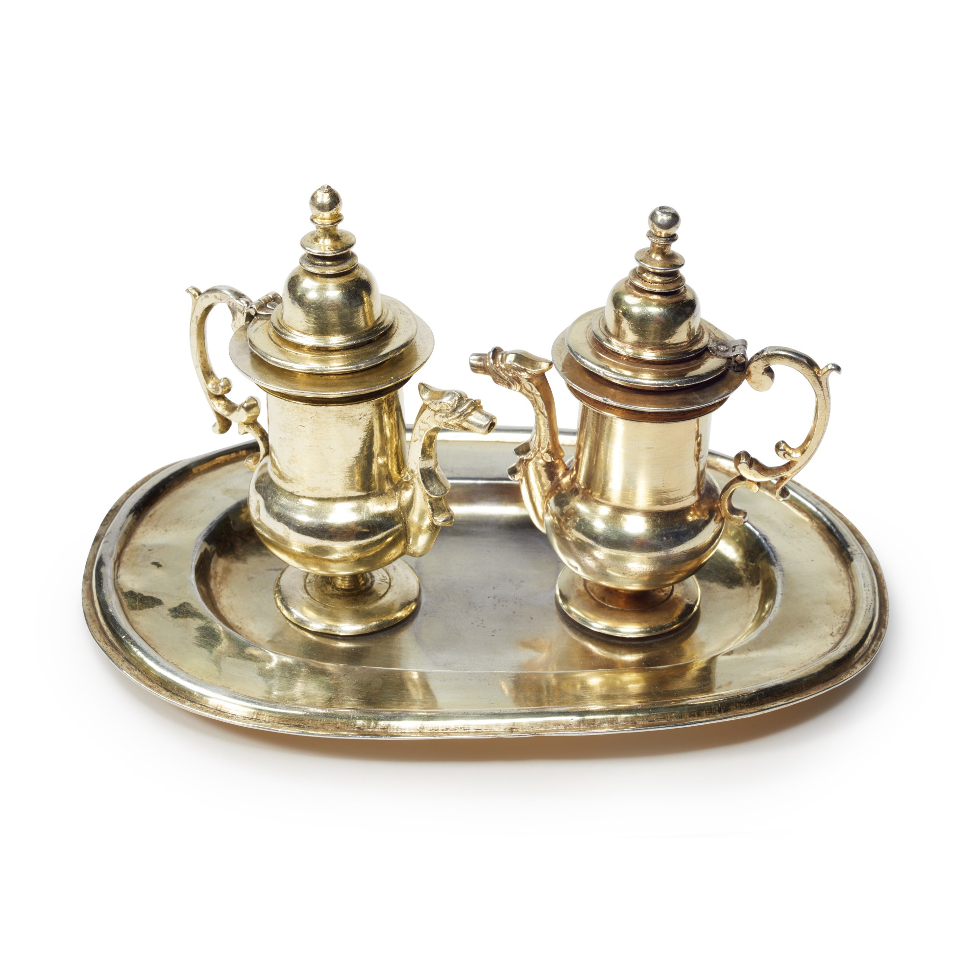 A Pair of Spanish Colonial Silver-Gilt Altar Cruets and Stand, Circa ...