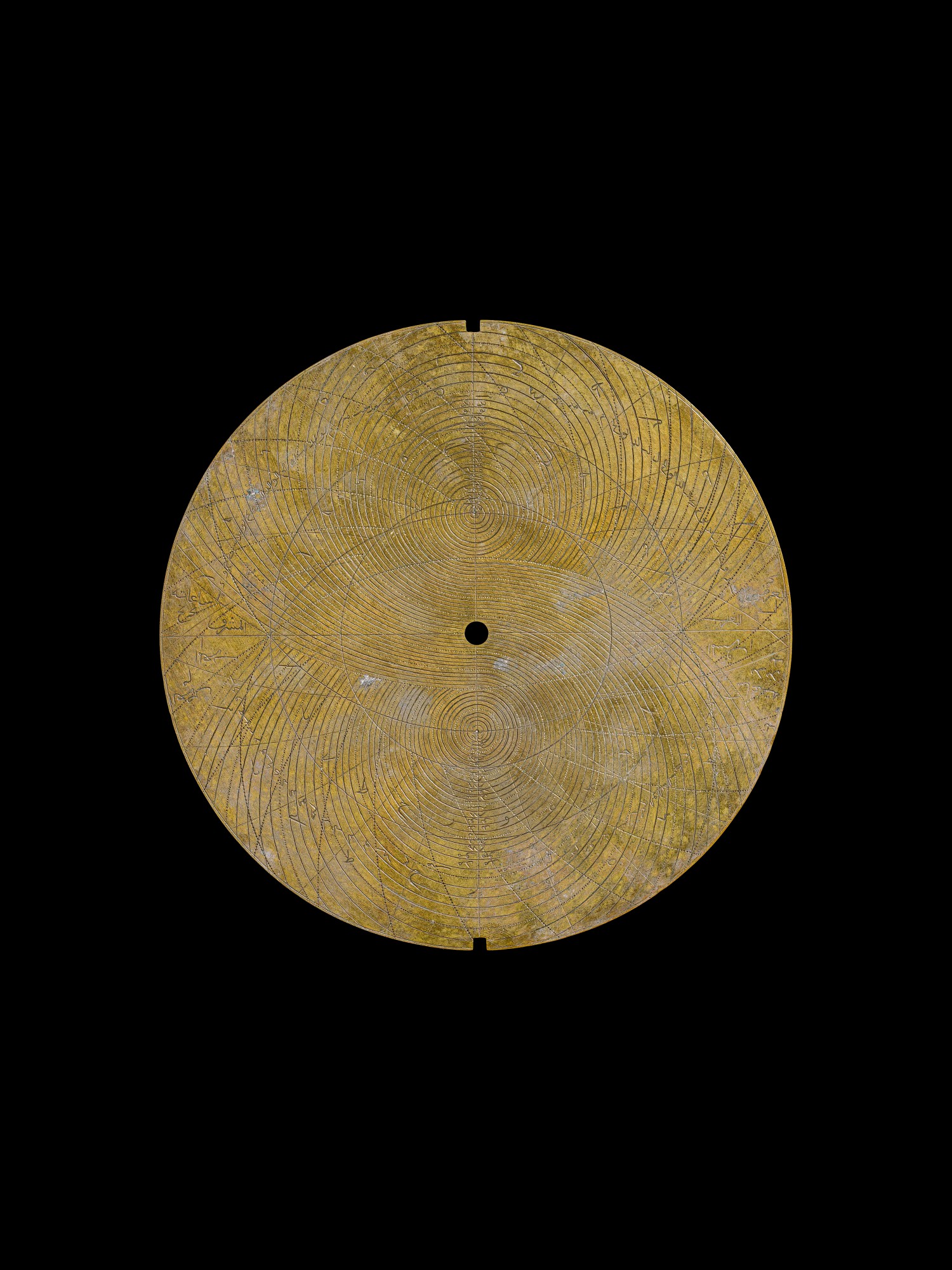 A large royal Mughal planispheric brass astrolabe, signed by Diya' al ...