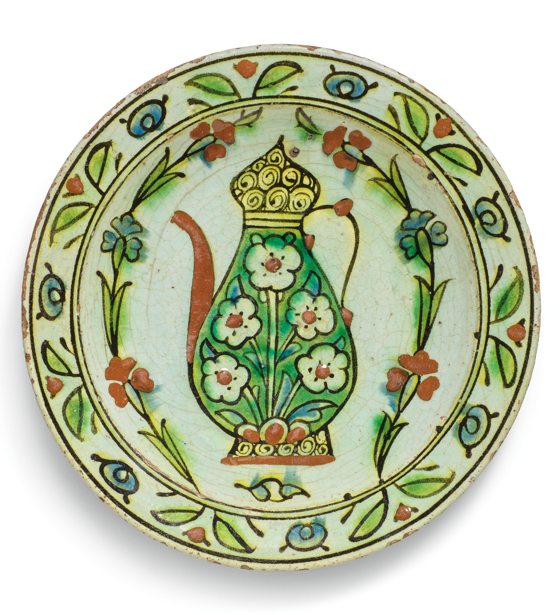 AN IZNIK POLYCHROME POTTERY DISH WITH A EWER, TURKEY, 17TH CENTURY ...